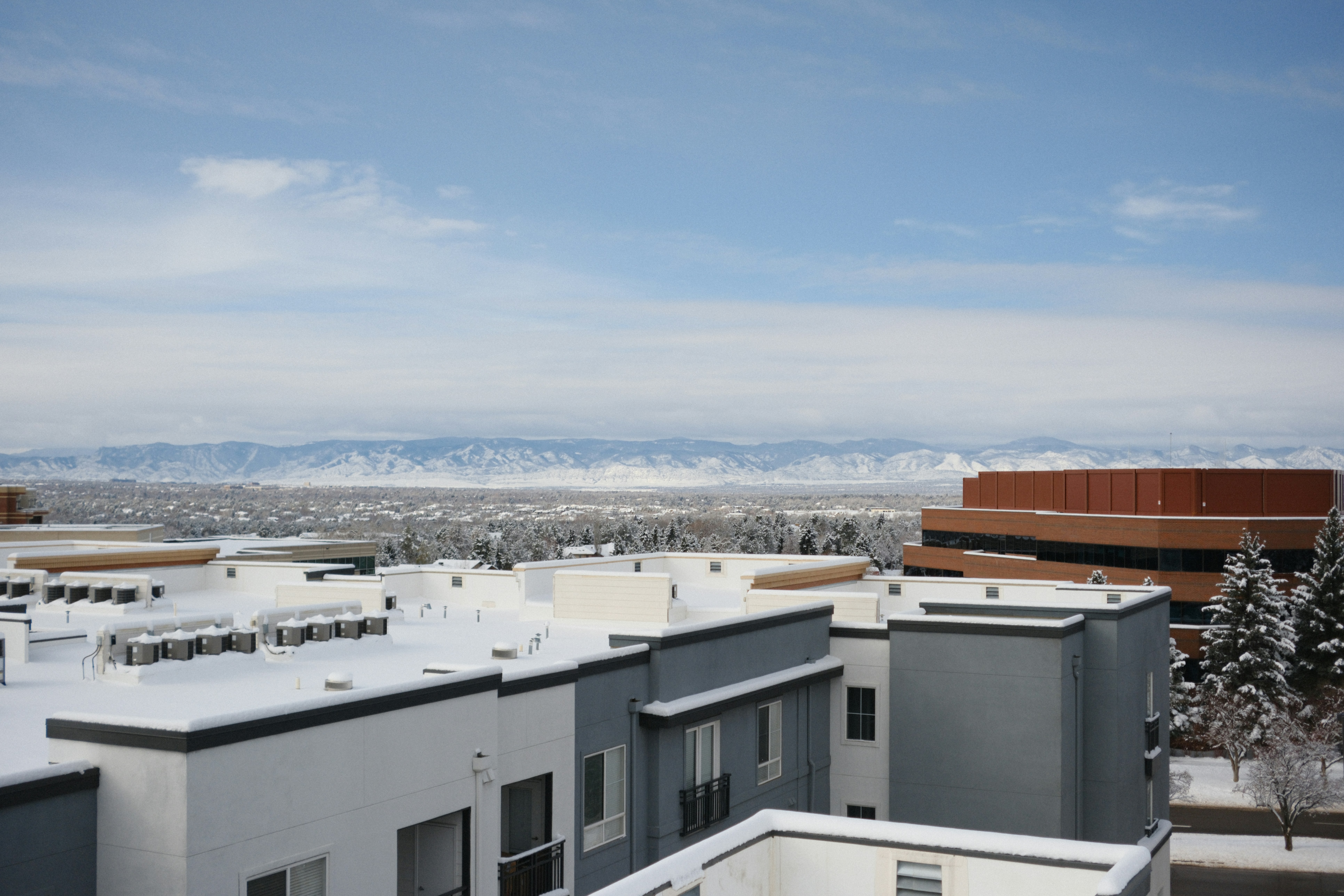 Snow-Crowned Terrace: Quiet Urban Edge Under Frosted Skyline