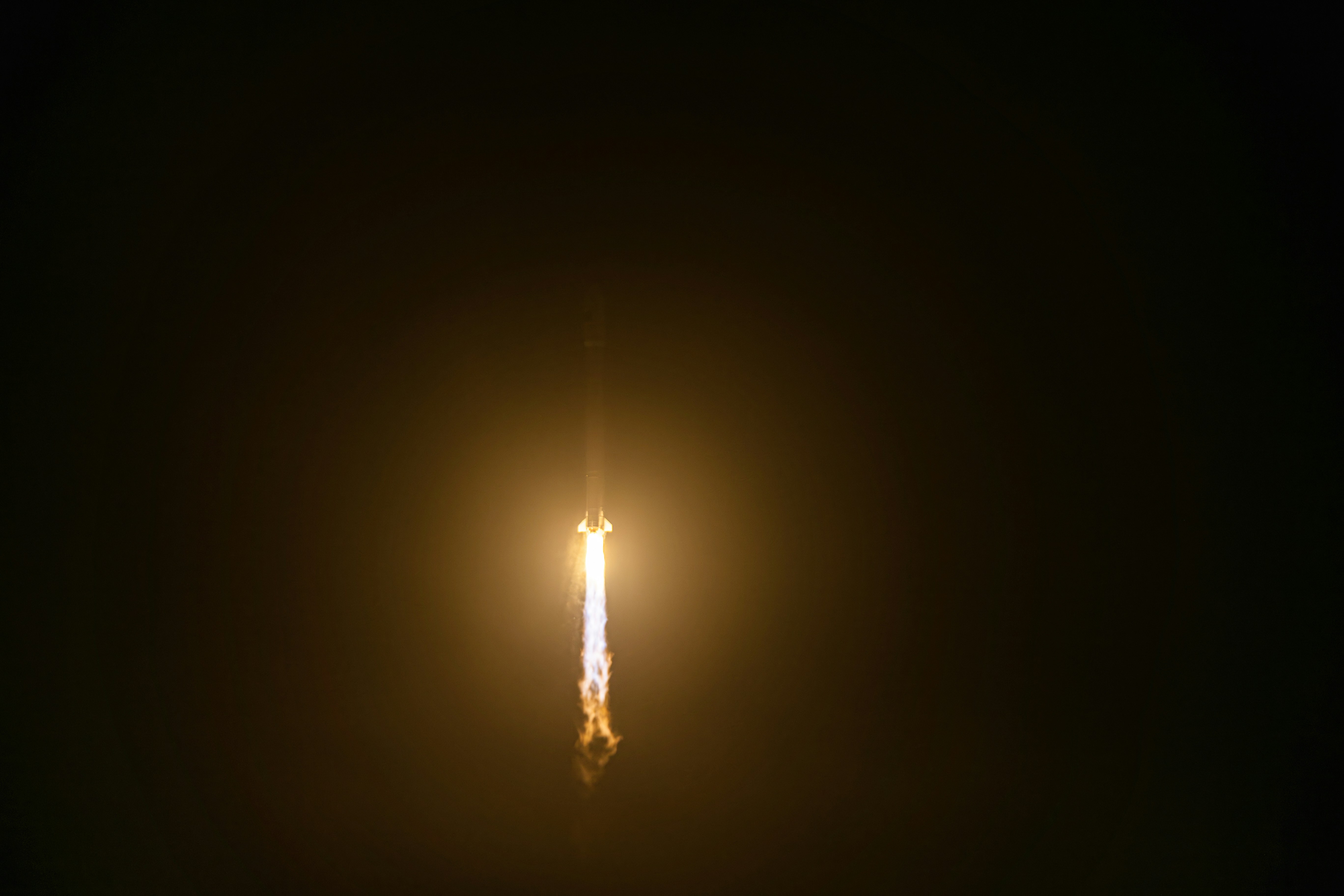 Midnight Descent: A Lone Rocket Pierces the Sky