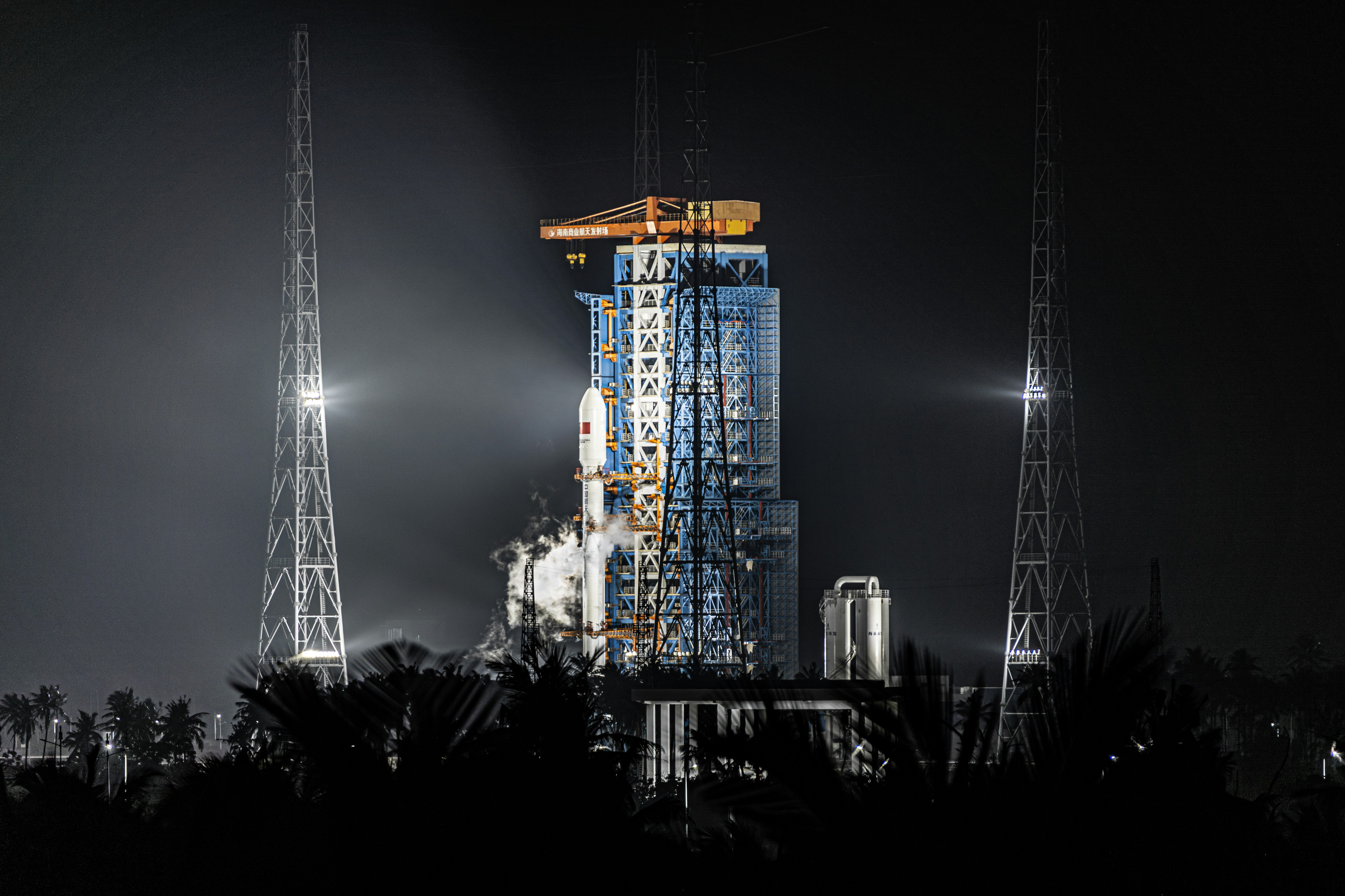 Night Launch: Tall Rocket Ignites the Sky