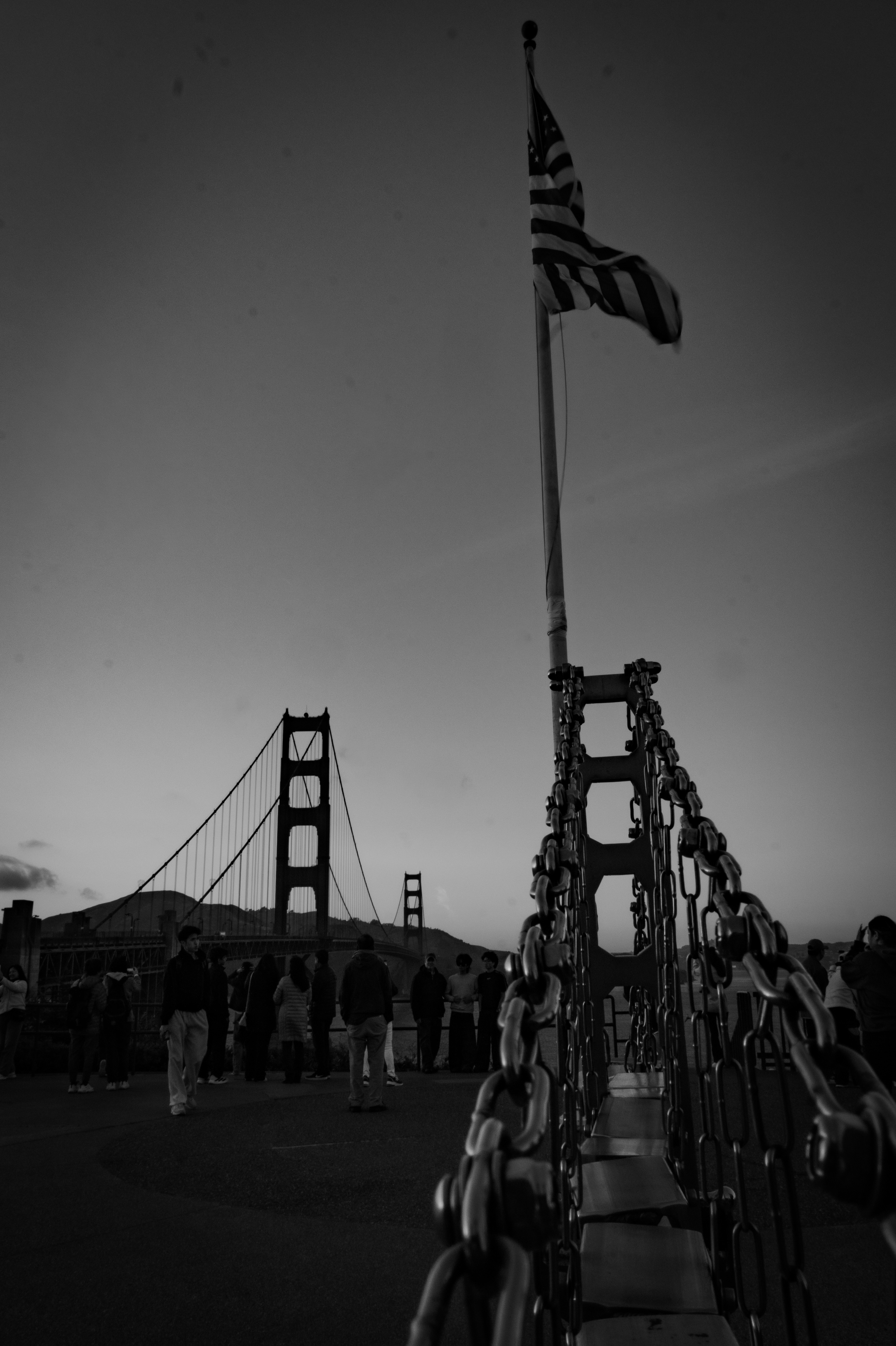 Flag, Bridge, and Shadows: A Quiet Evening on the Golden Gate