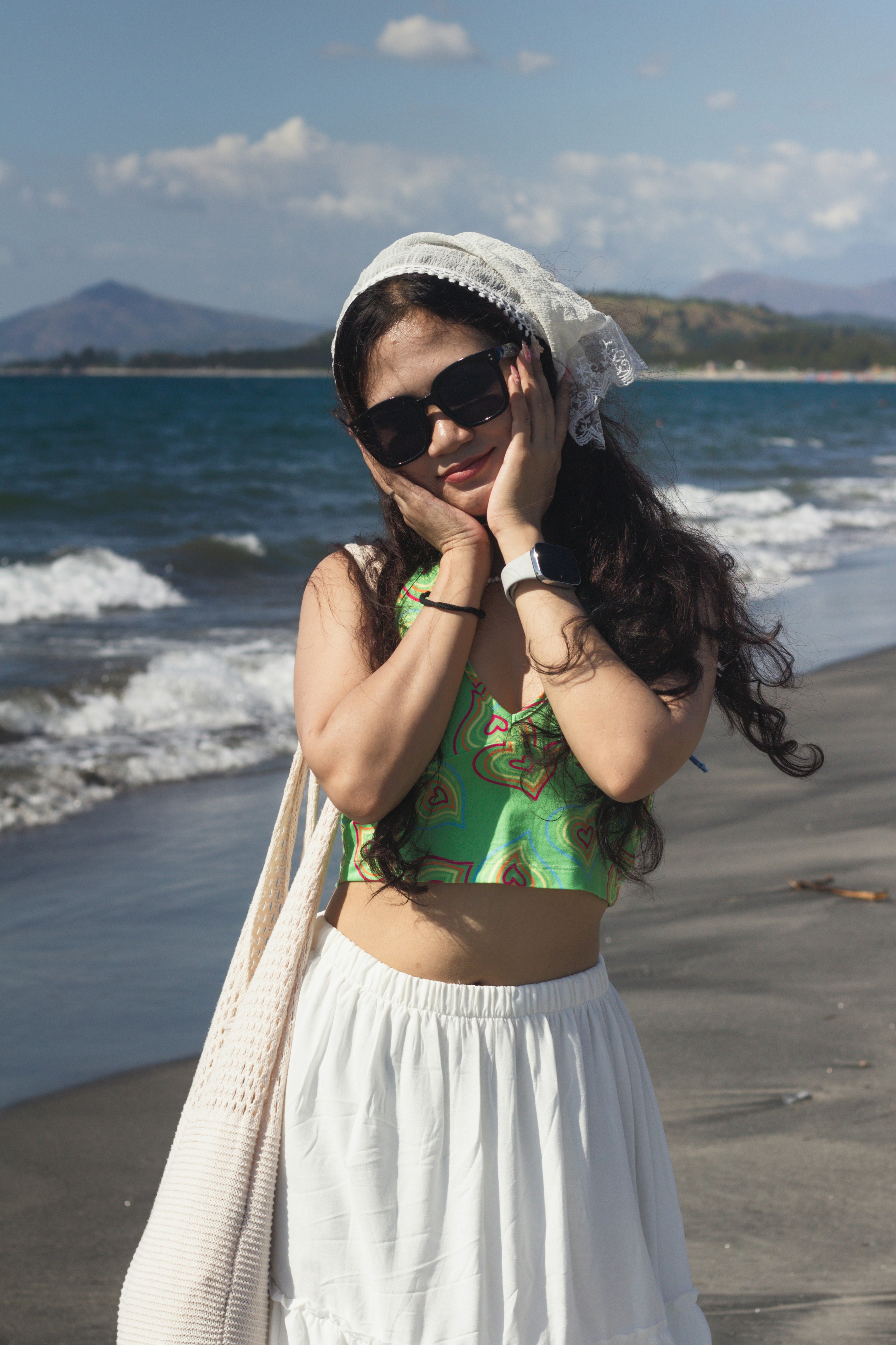 Sunlit Seaside Portrait: Contemplation by the Waves