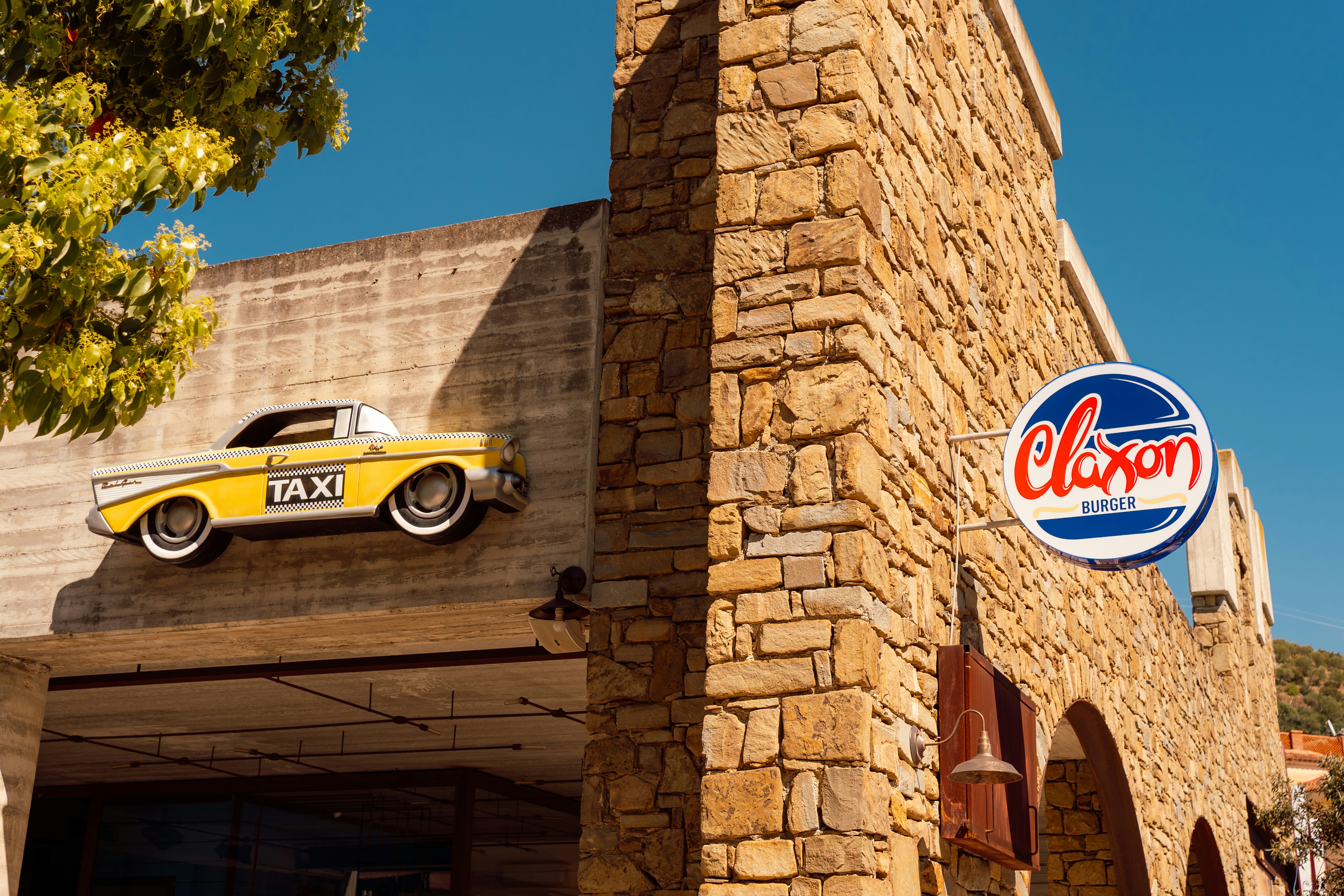 Yellow Taxi Car Cabins the Corner Signage