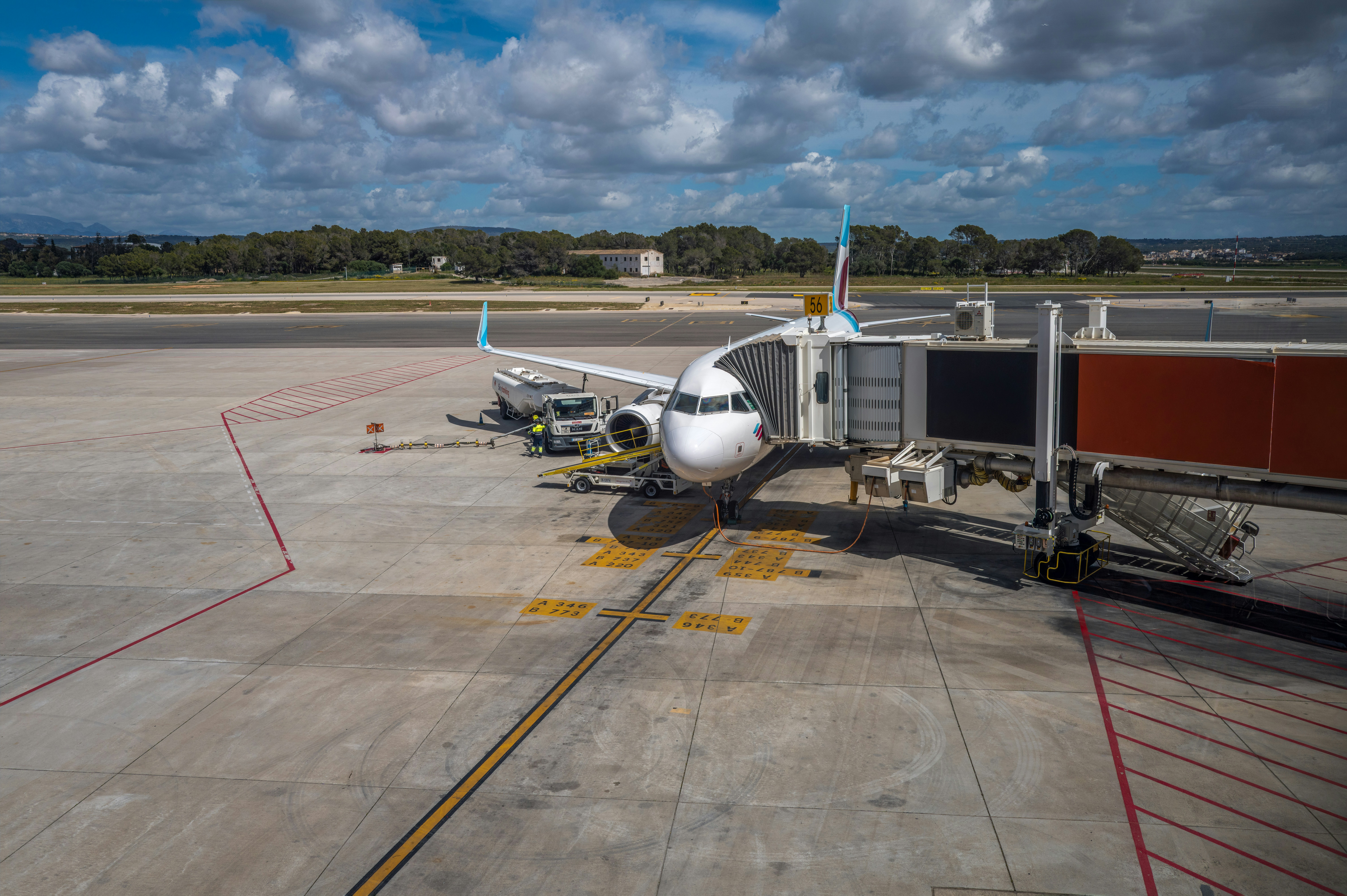 Jetway Quiet Power: A parked airplane at the gate under a dramatic sky