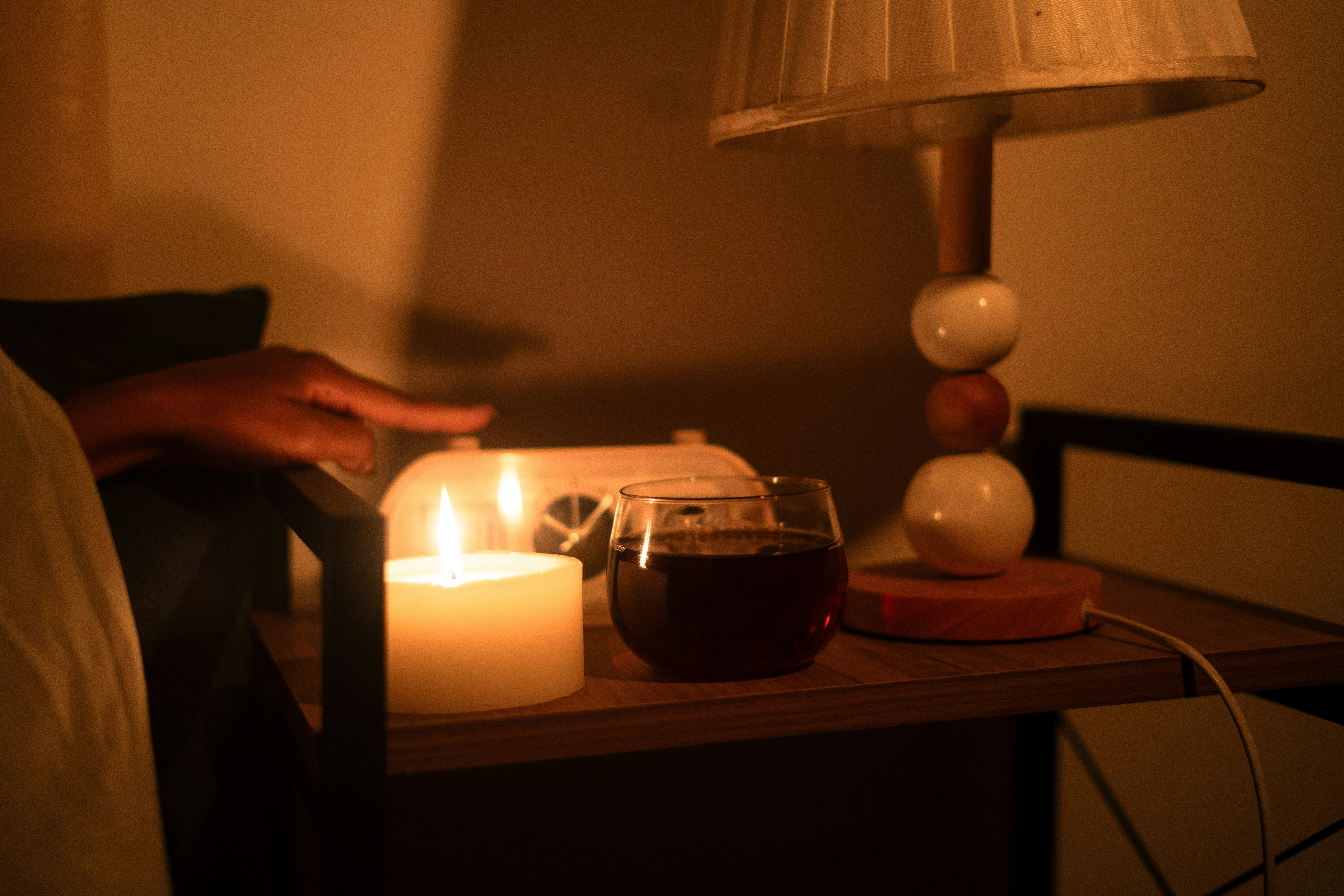 Candlelit Quiet: A Nightstand Communion with Warm Glow