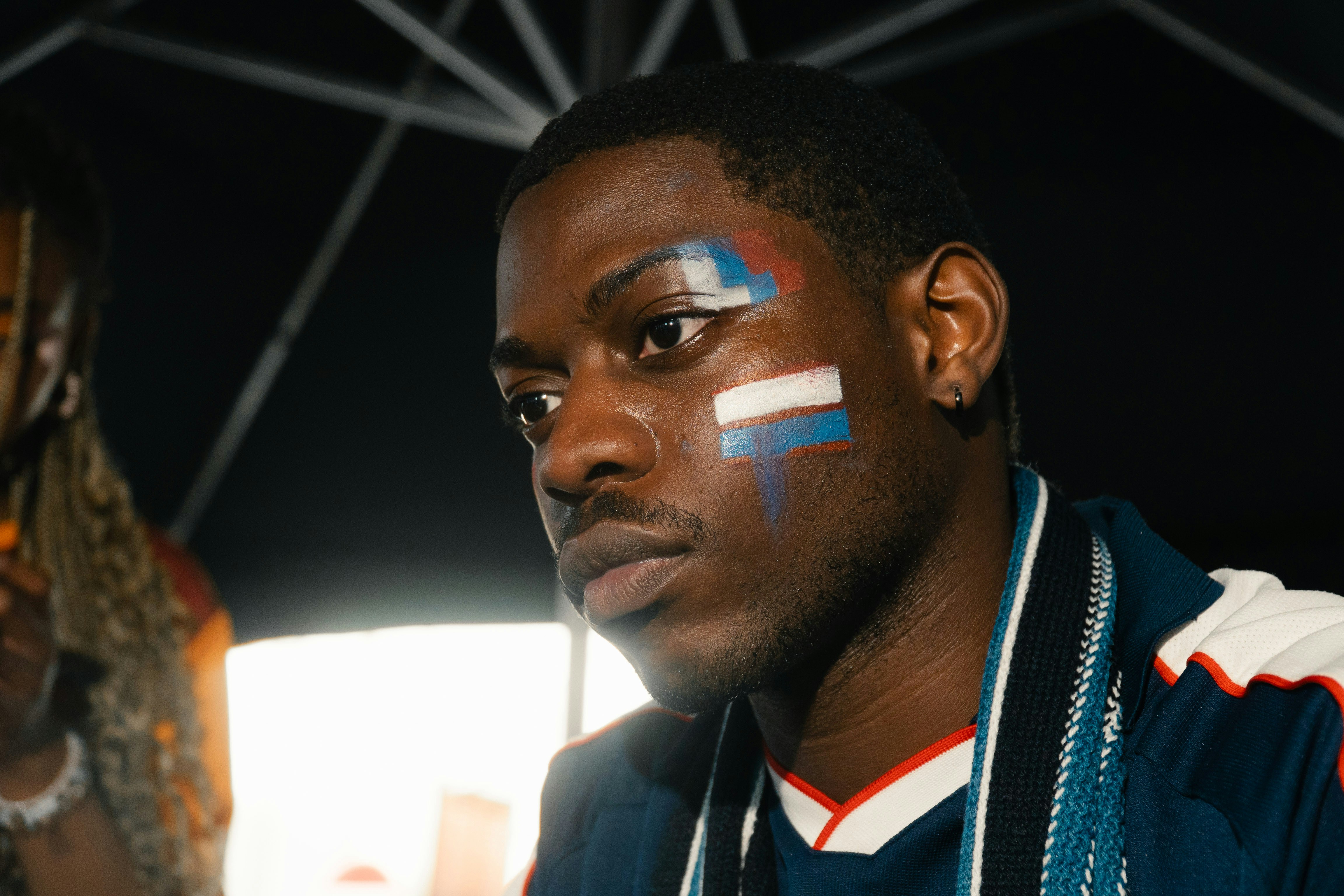 Face paint and Night Light: A Portrait Under Neon Edges