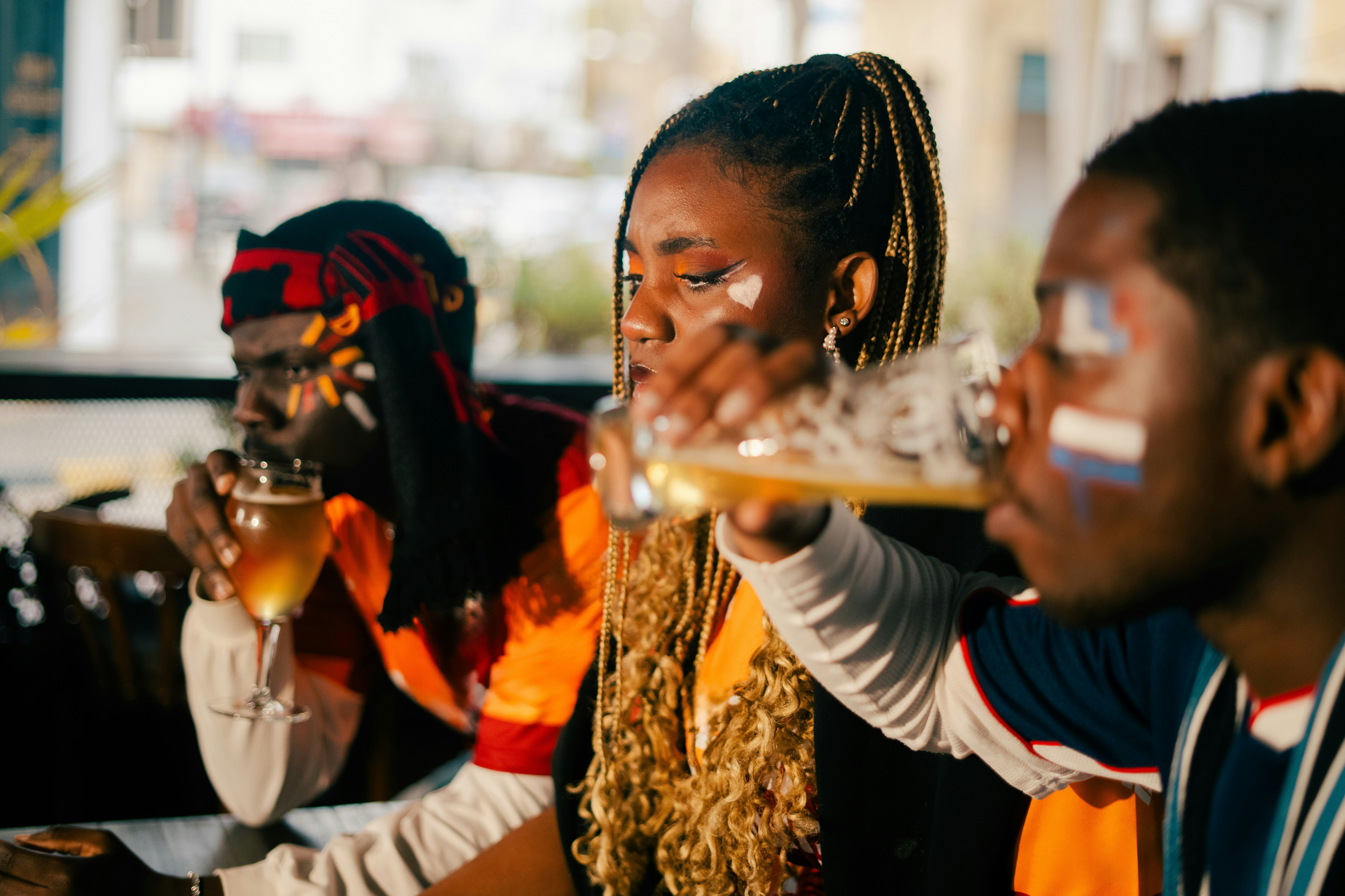 Toasting Colors: A Shared Moment of Cheer and Portraits