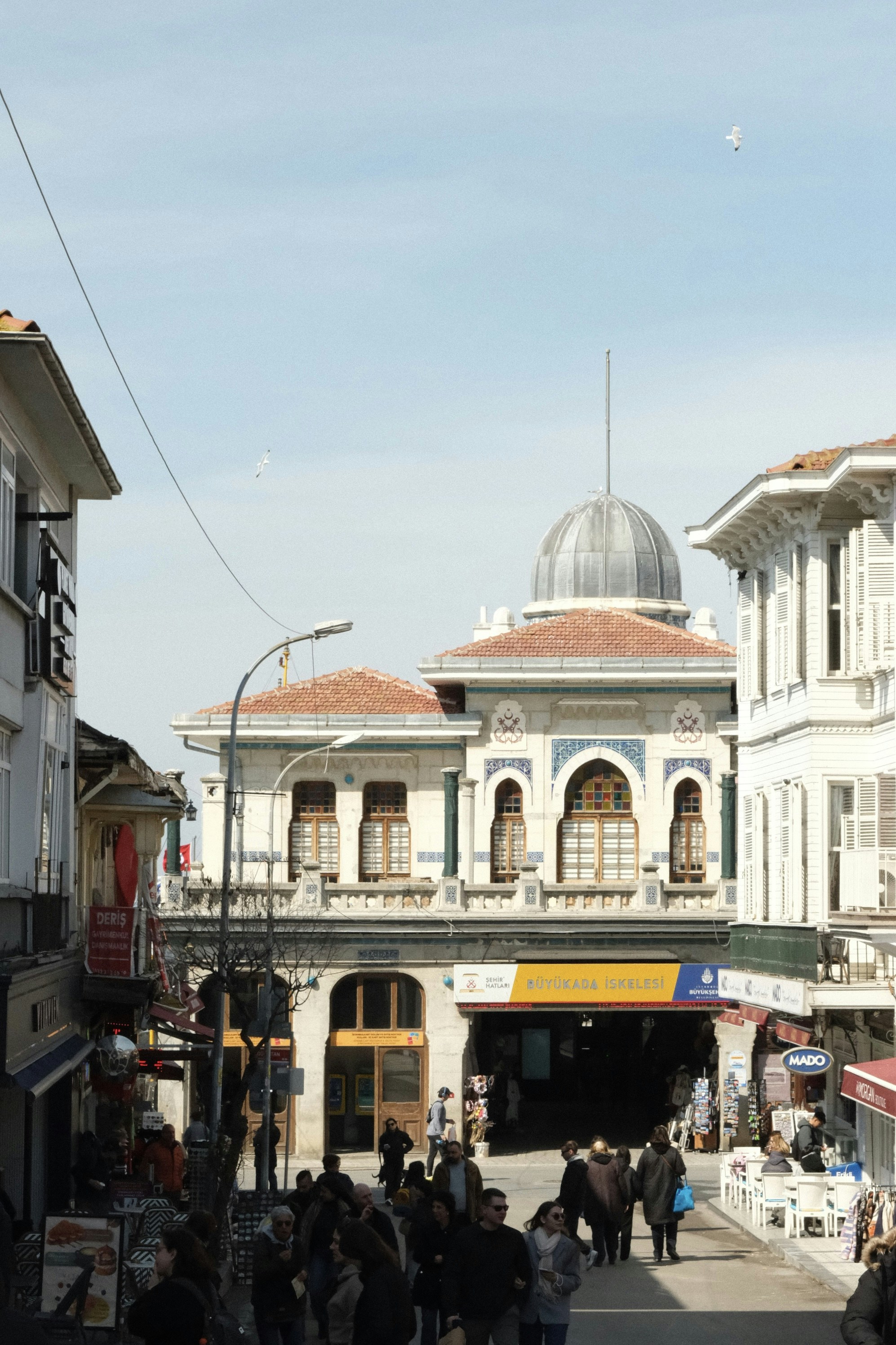 Domed Civic Facade Framing a Lively Street
