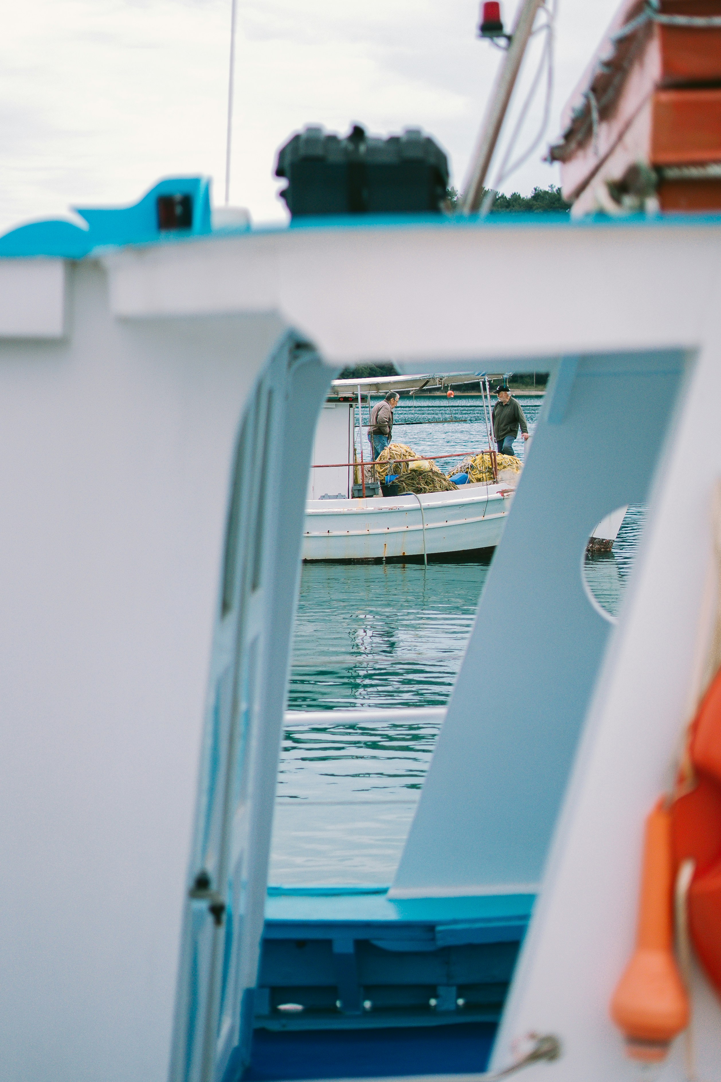 Through the Cabin Frame: Harbor Work Beyond the Doorway