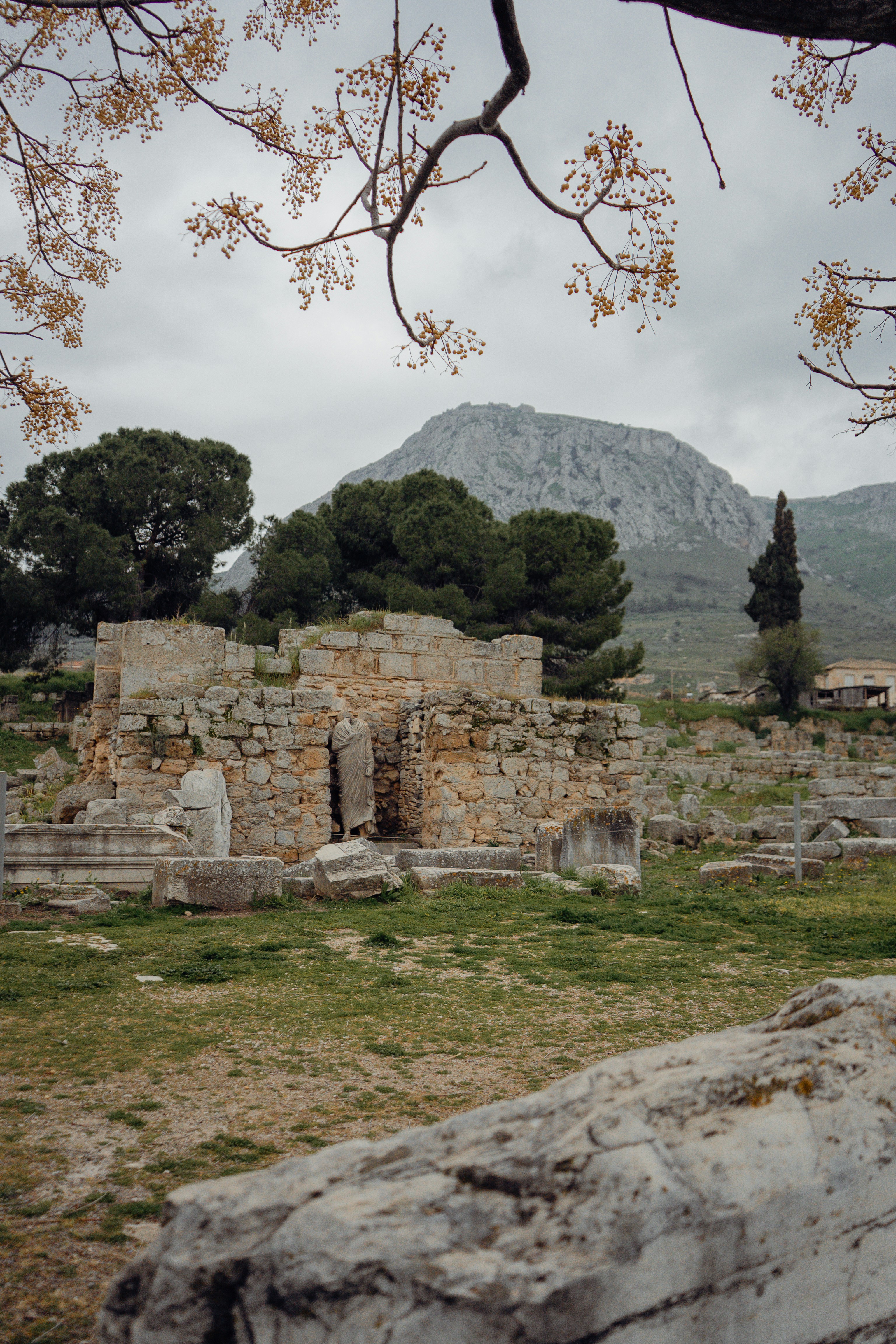 Ruined Stone Fragment Beneath a Mountain Ridge