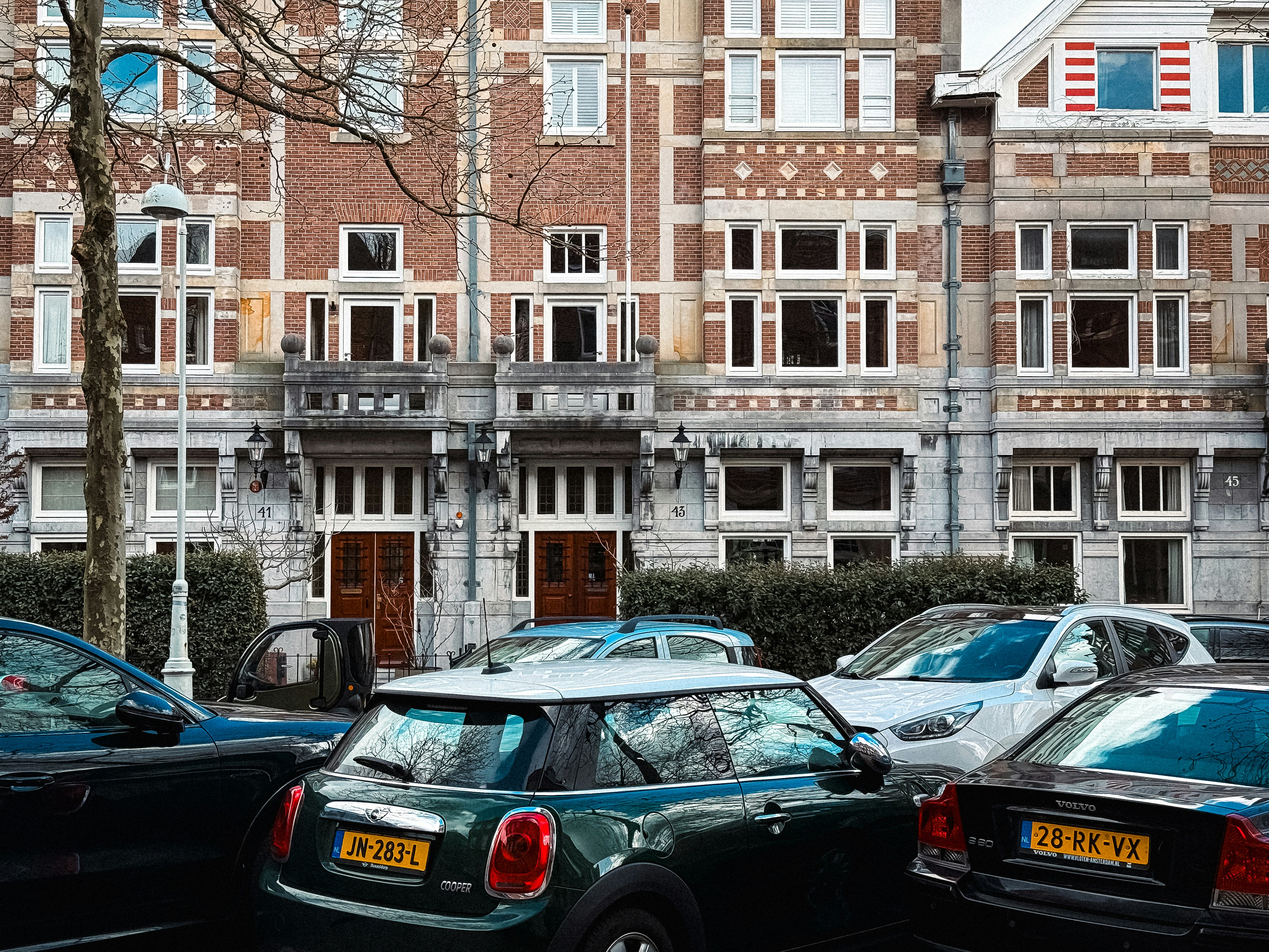 Portrait of a Quiet City: Cars Graced by Historic Facades
