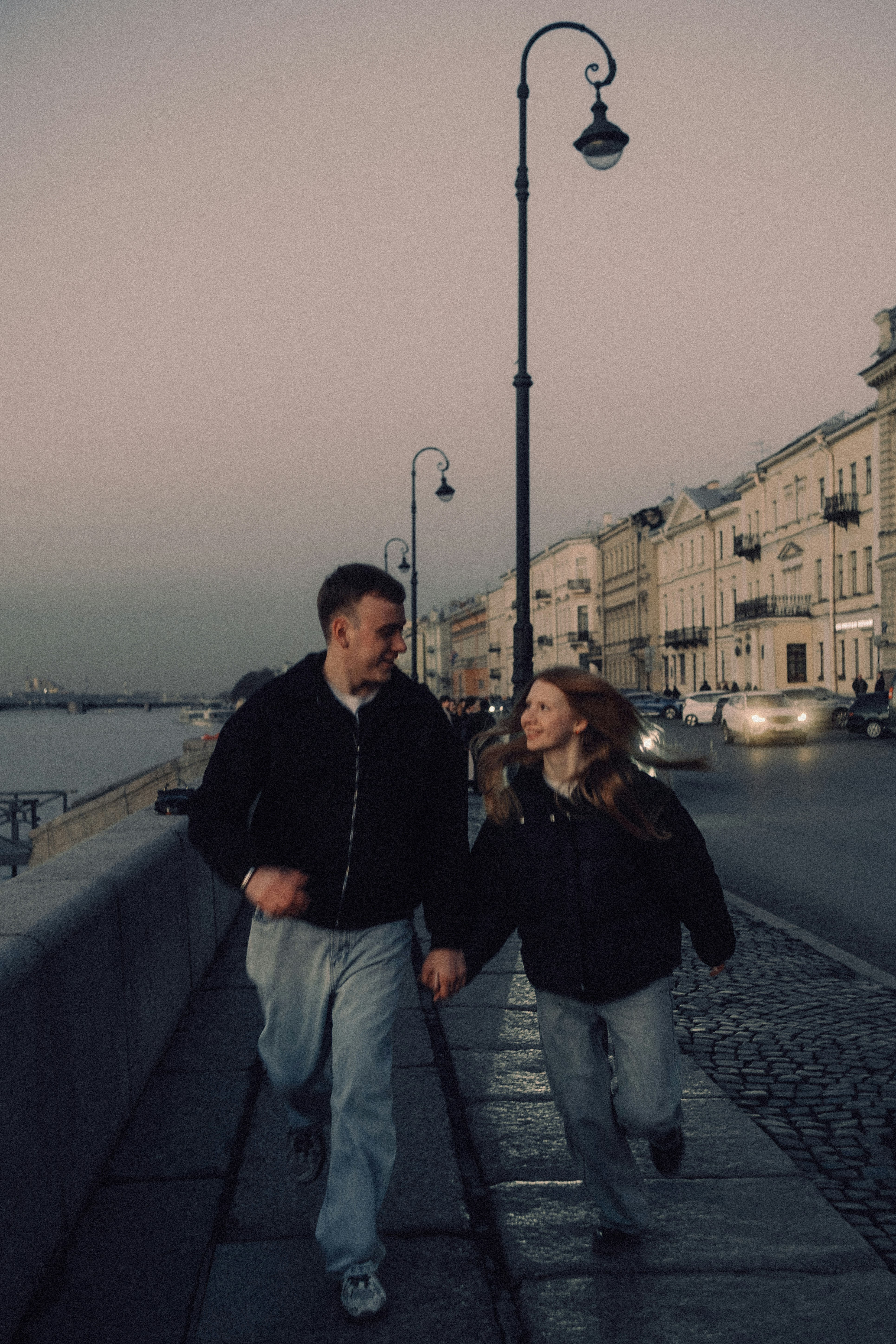 Two Walks on a Cobblestone Corridor by the Sea