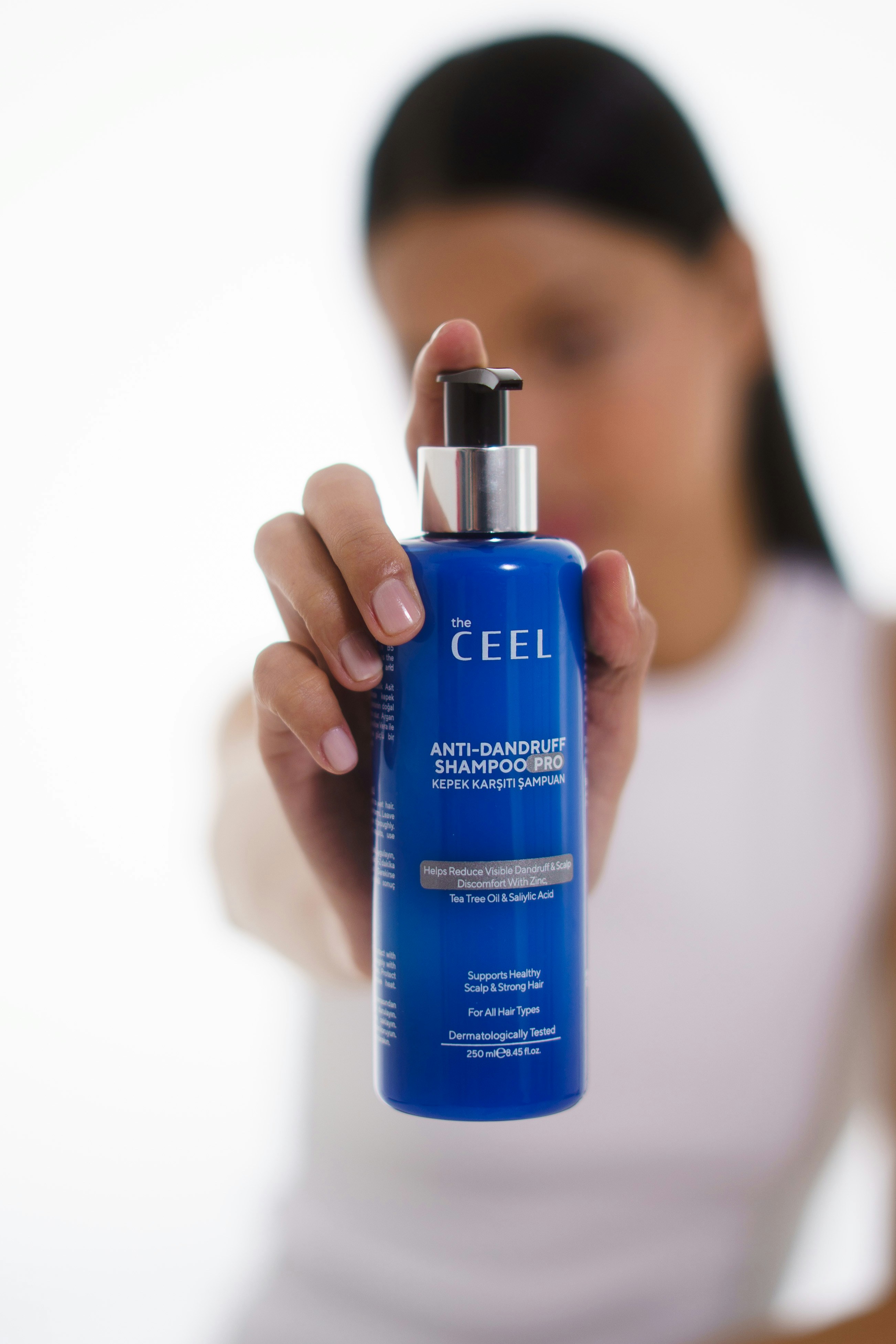 Blue Bottle, Bold Focus: A Haircare Moment in Sharp Detail