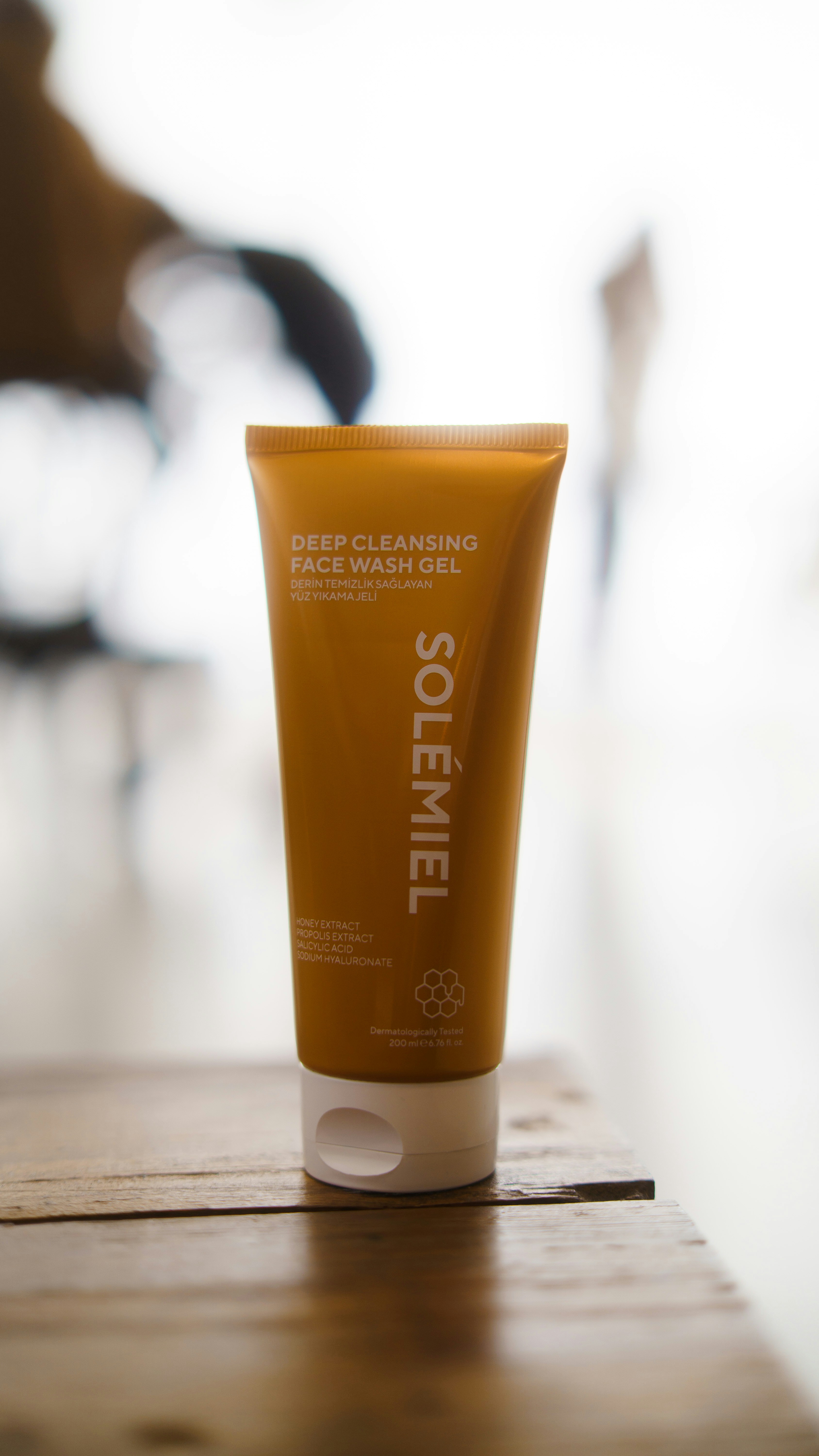 Gold Tube of Cleanser: Central Focus on a Minimal Ritual