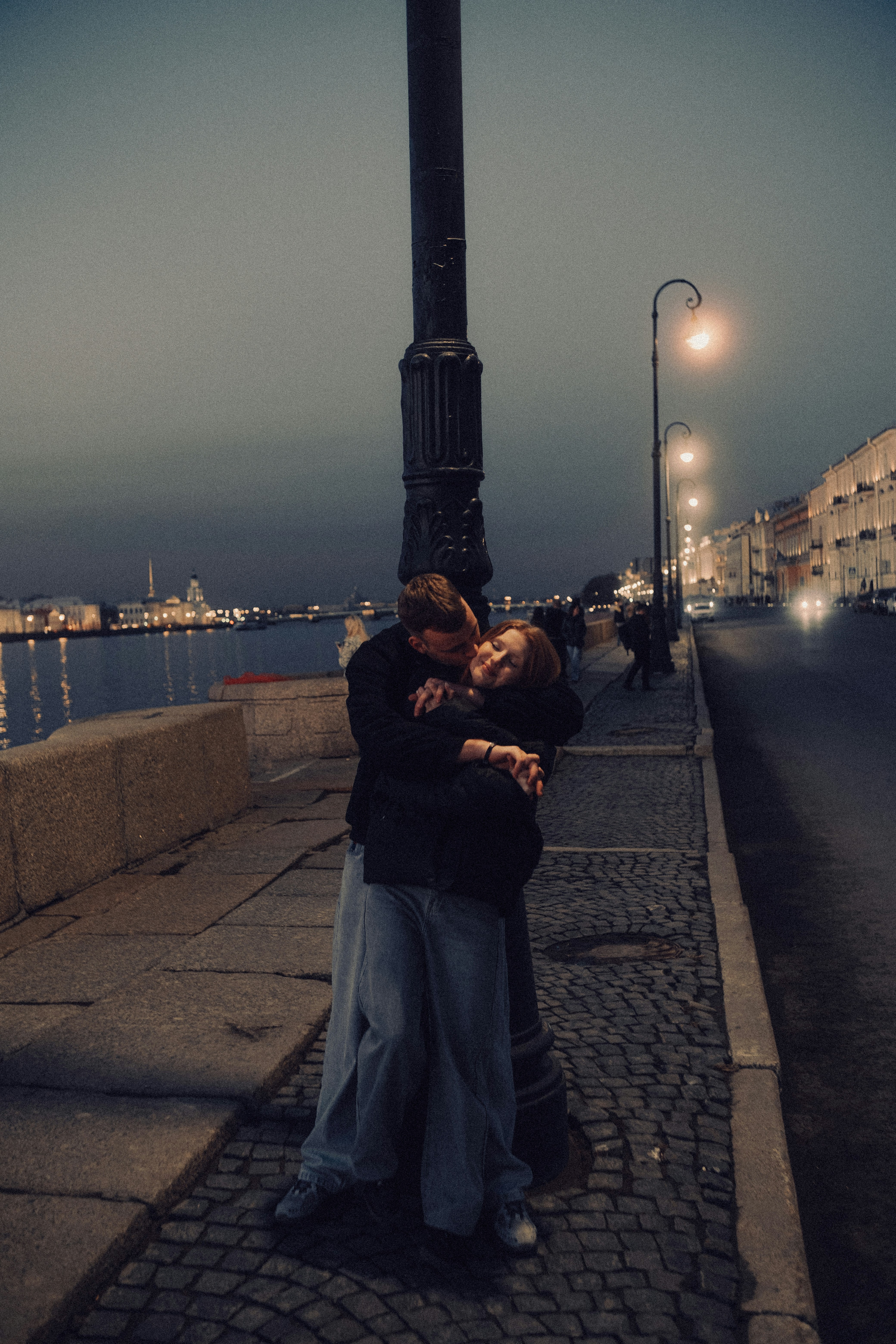 Whispered Embrace by the Waterfront Lanterns