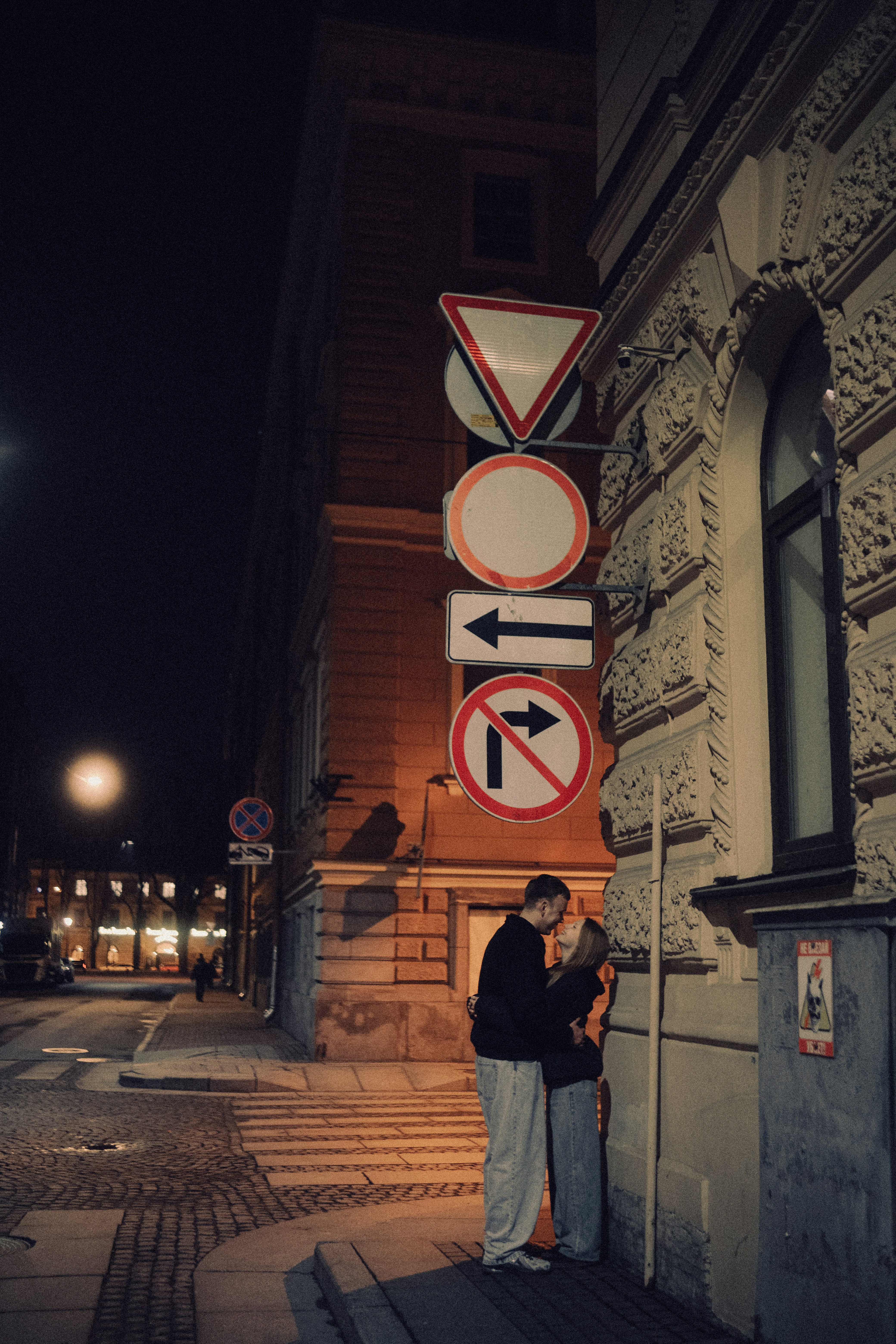 Streetwise Night: A Quiet Moment by the Ornate Facade