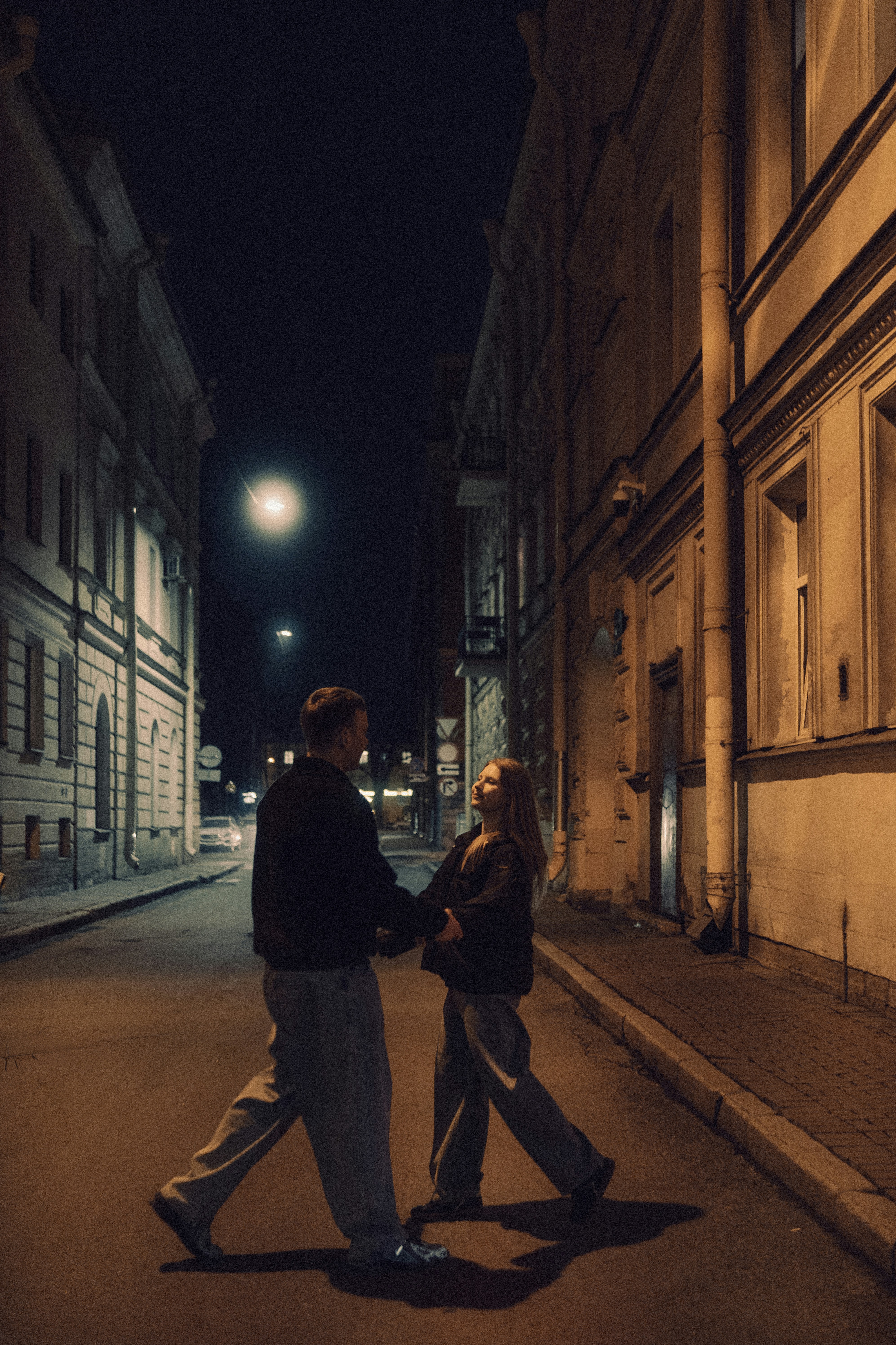 Moonlit Street Dance: A Quiet Night Moment Between Two companions