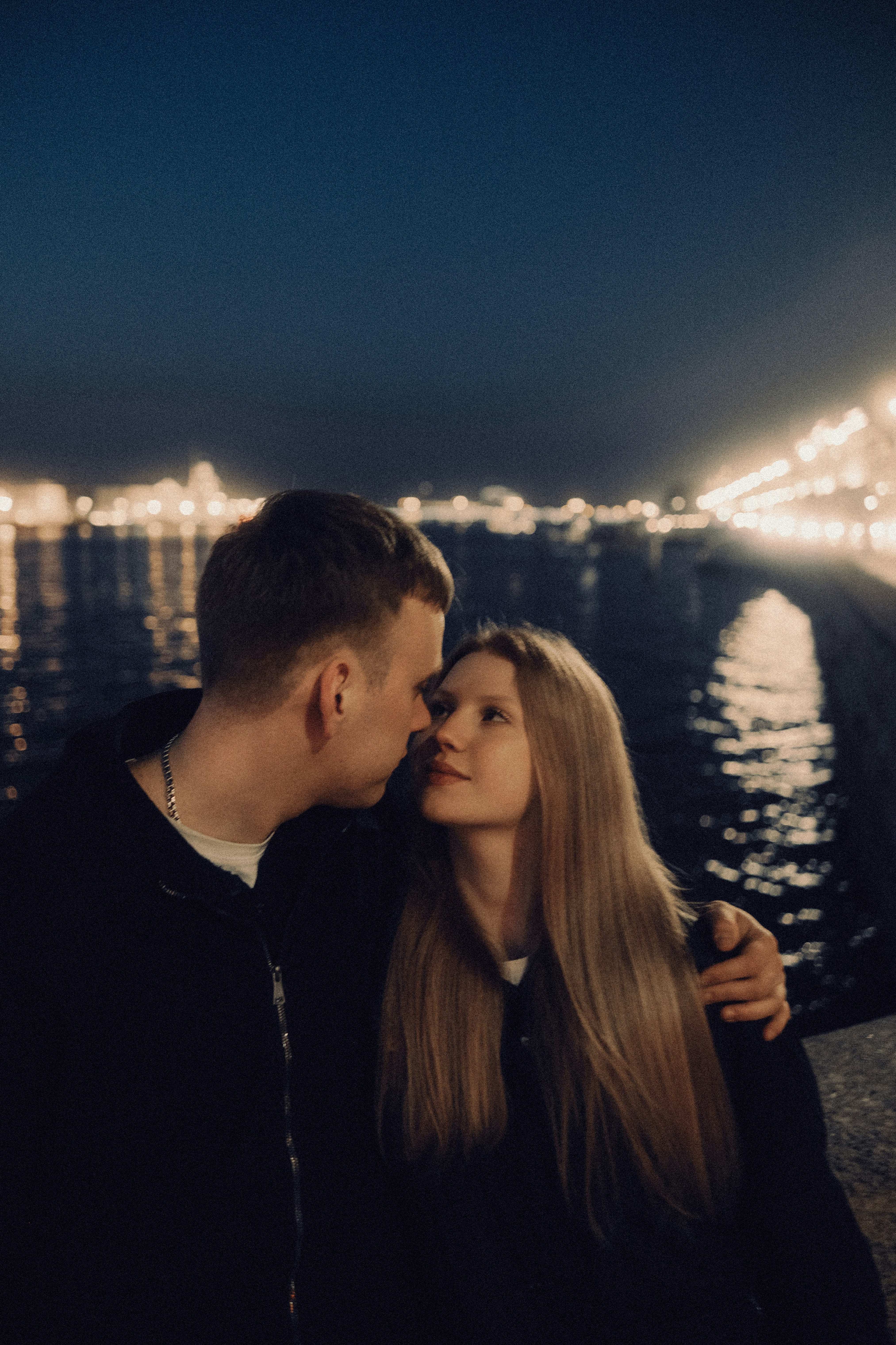 Whispers by the Waterfront: A Quiet Night Embrace