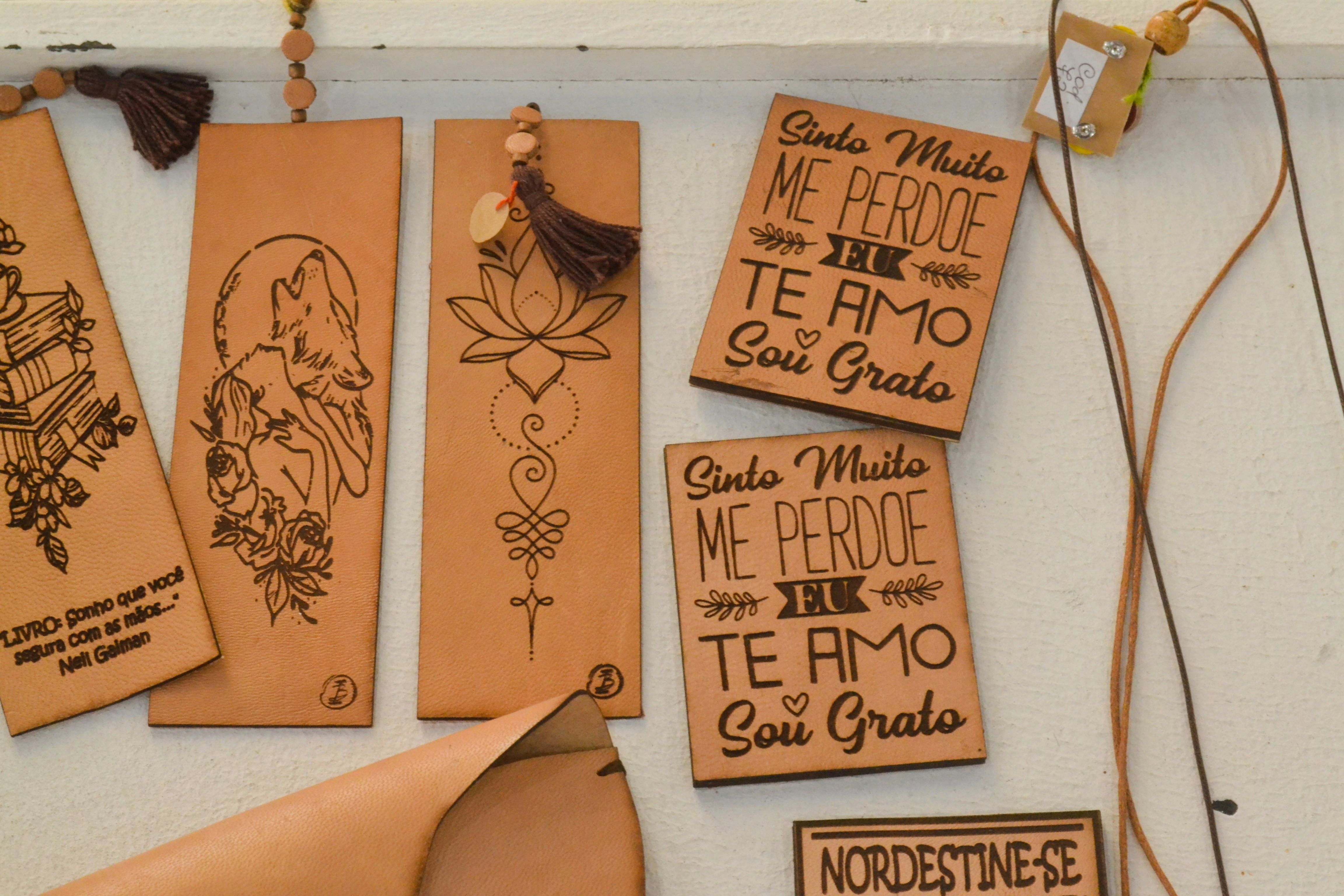Handwritten Labels on Leather Tags at a Market Stall