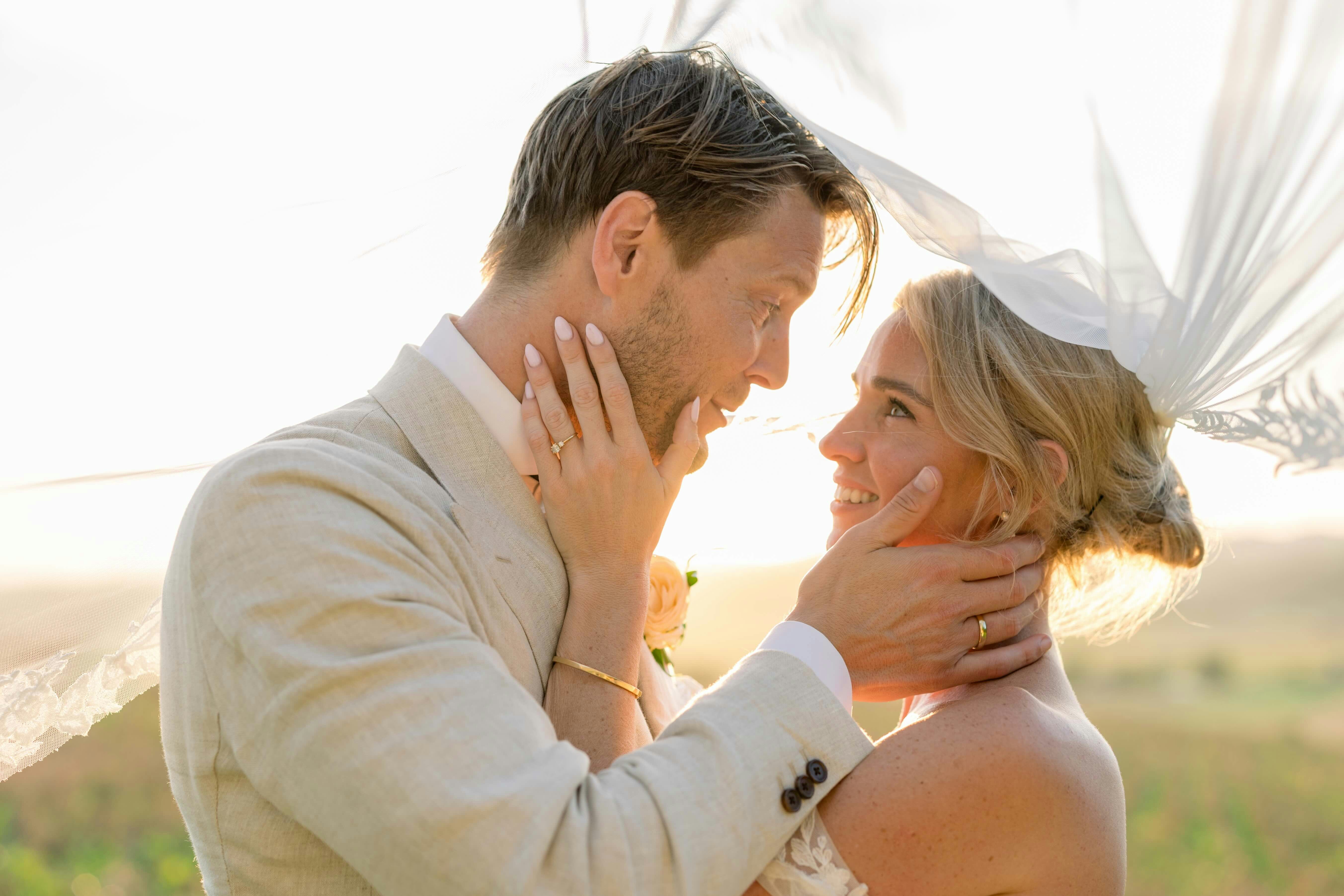 Bridal Veil Moment: A Tender Exchange Under Soft Sunlight