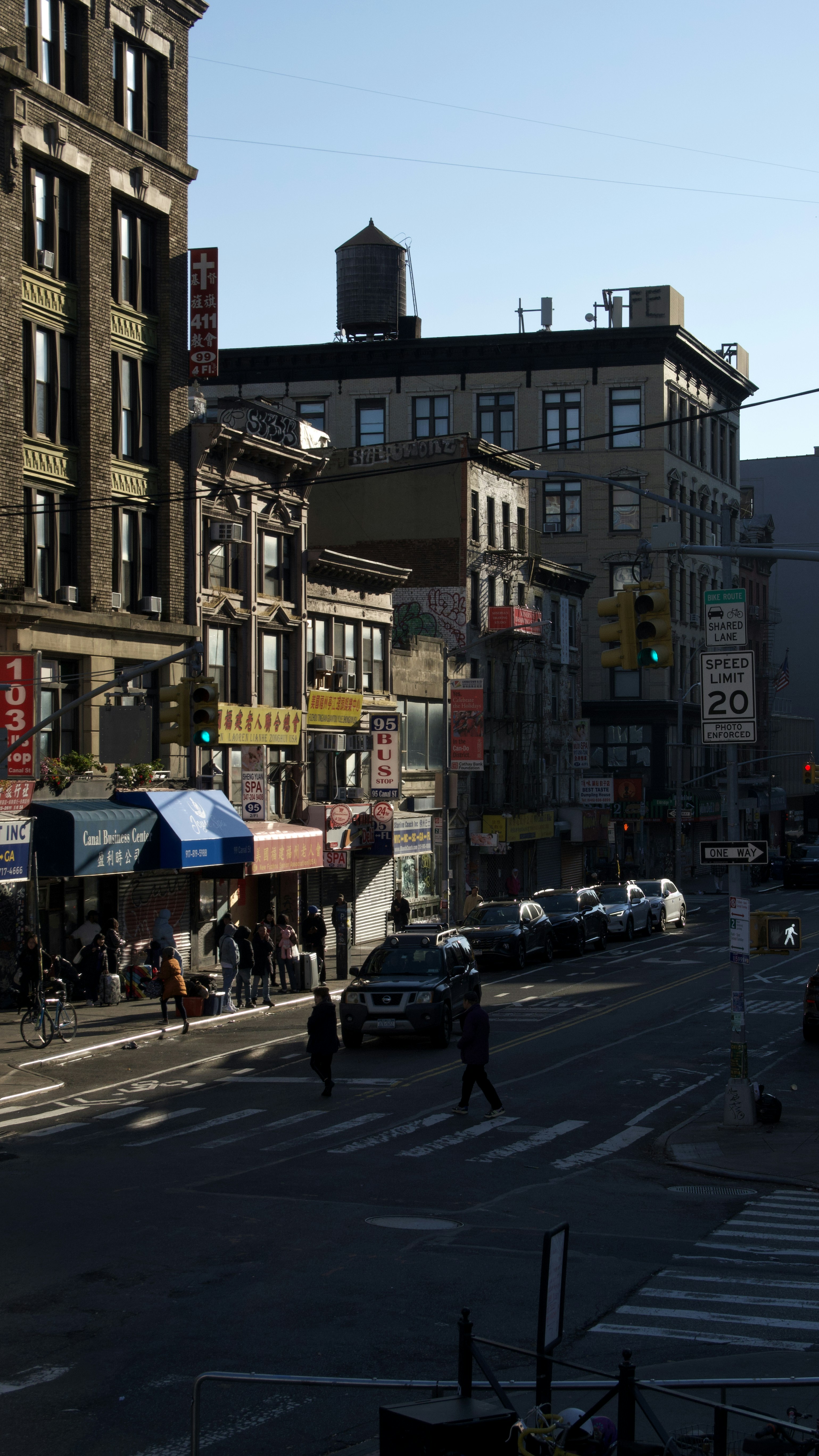 Urban Street Scene: Sunlit Facades and Shaded Sidewalks