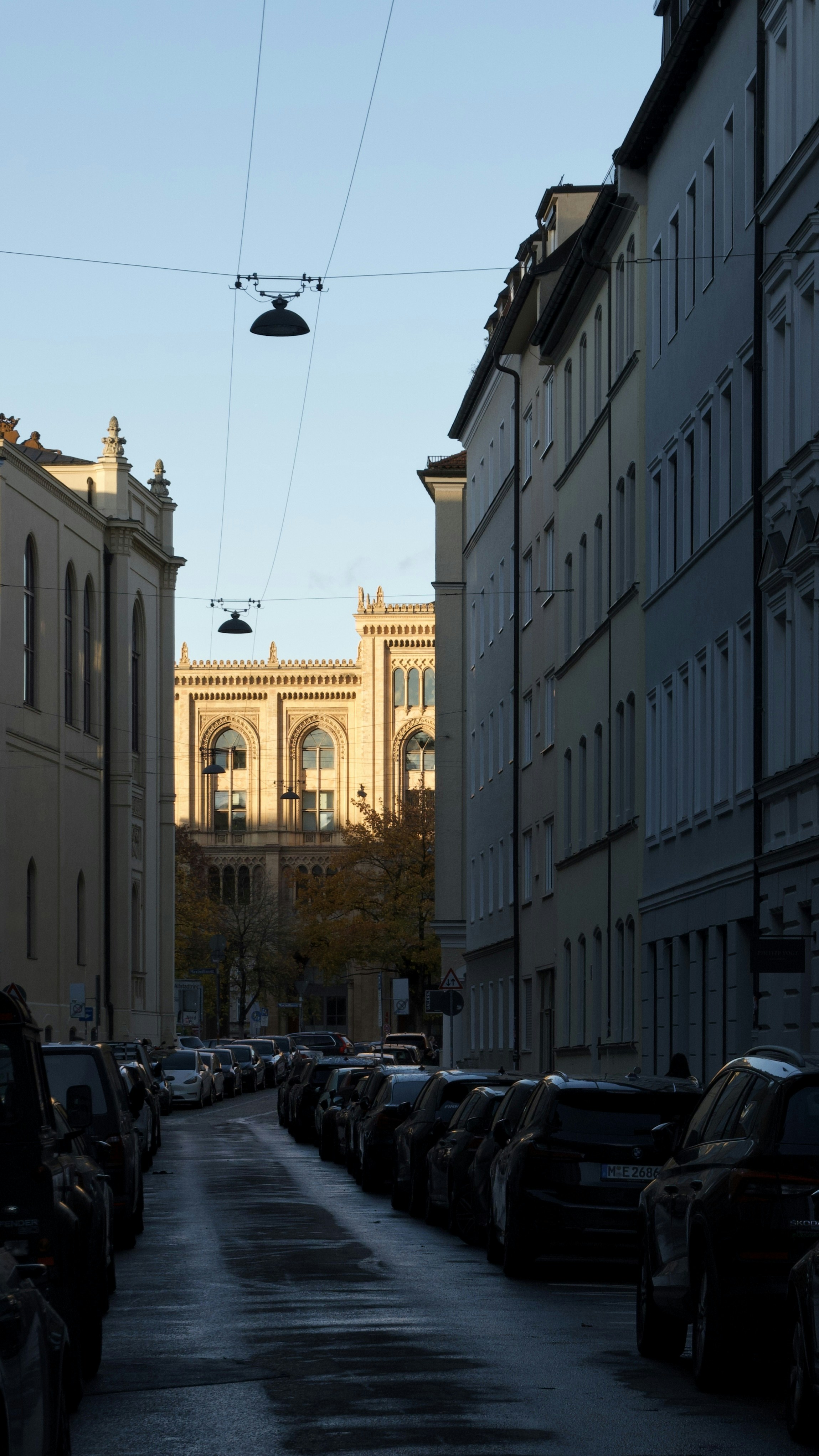 Sunlit Archway Beyond a Quiet City Street