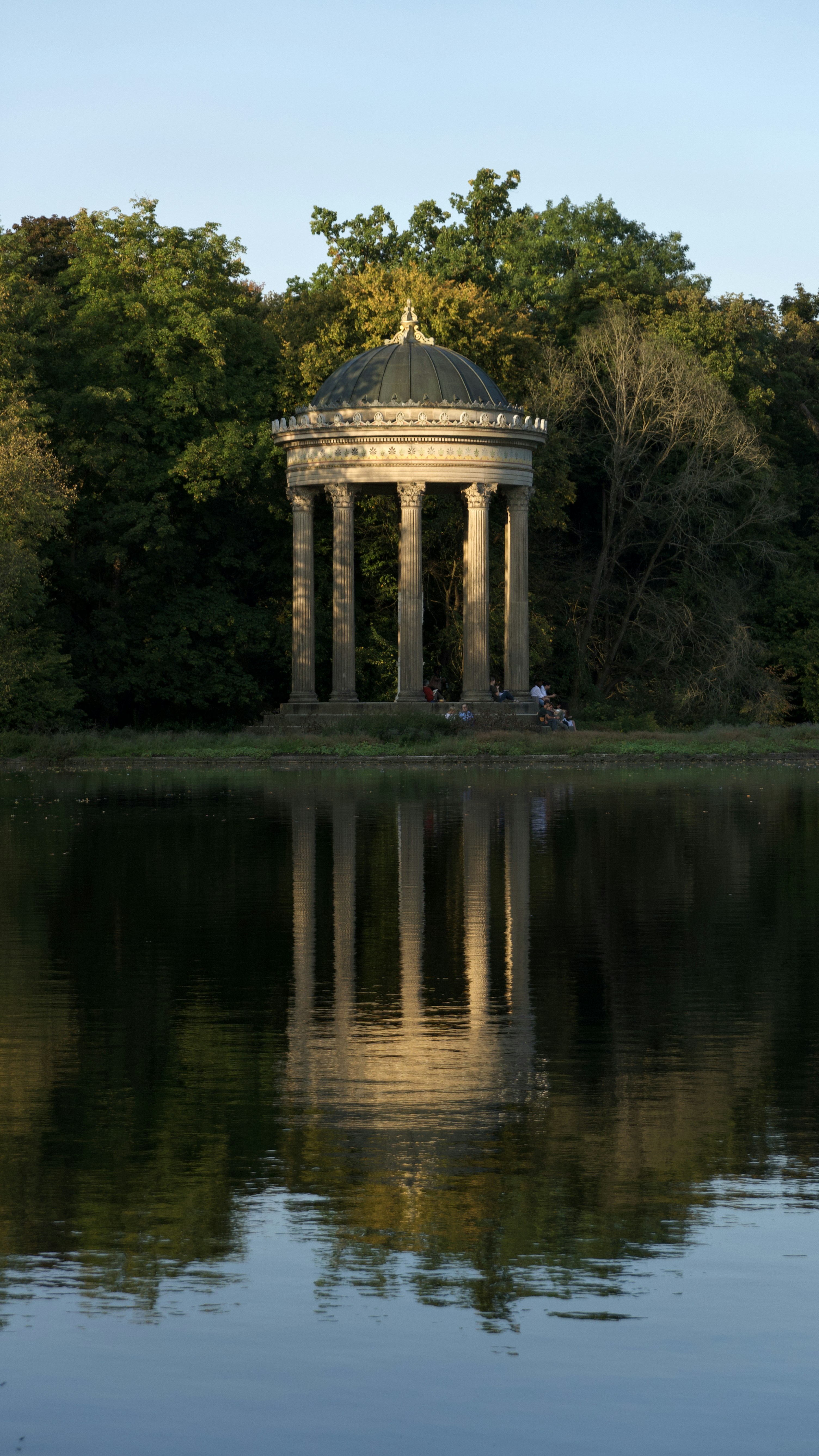 Sunlit Circular Temple by the Lake