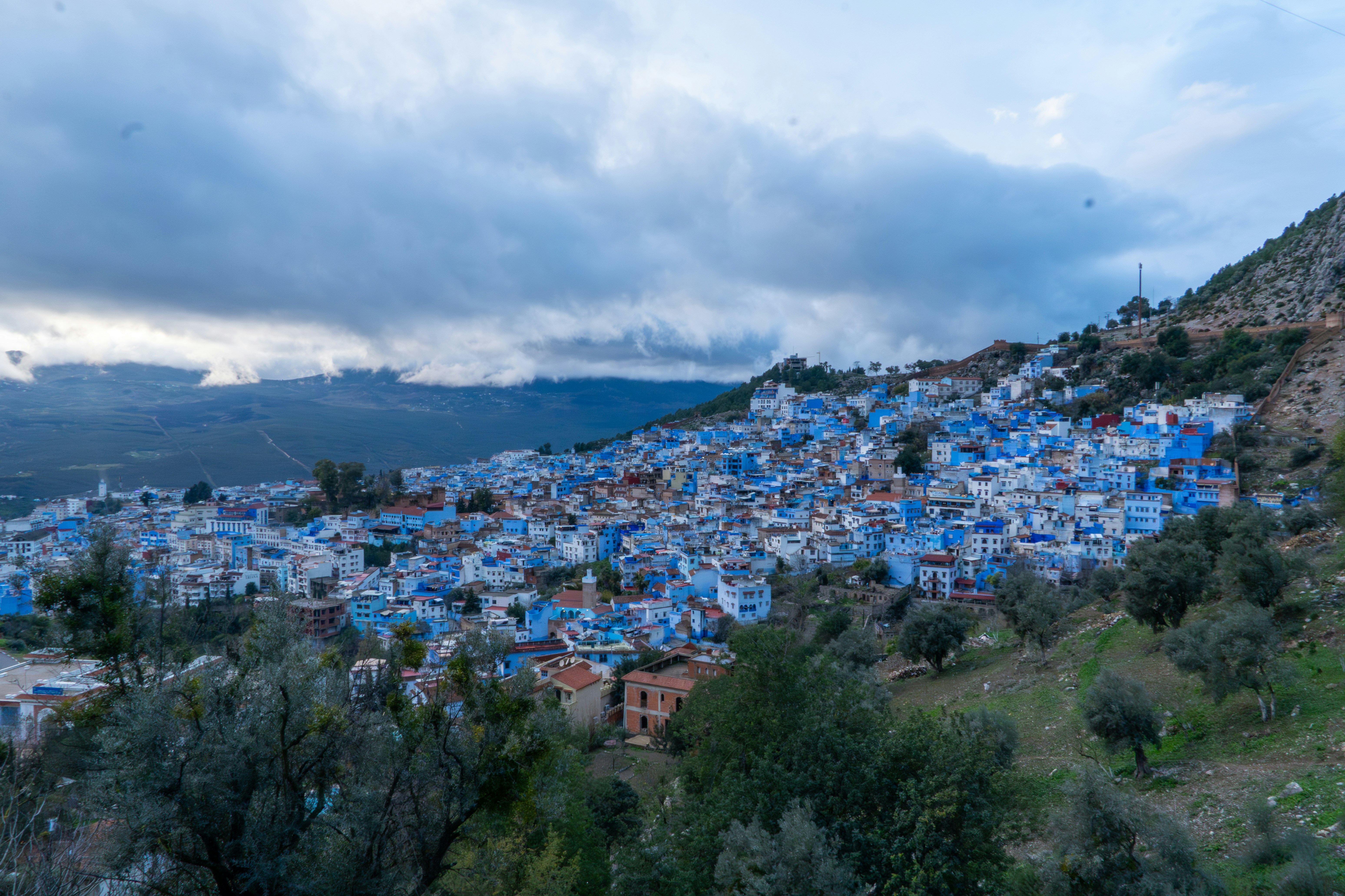 Blue-Tiled Village on the Mountain Sky
