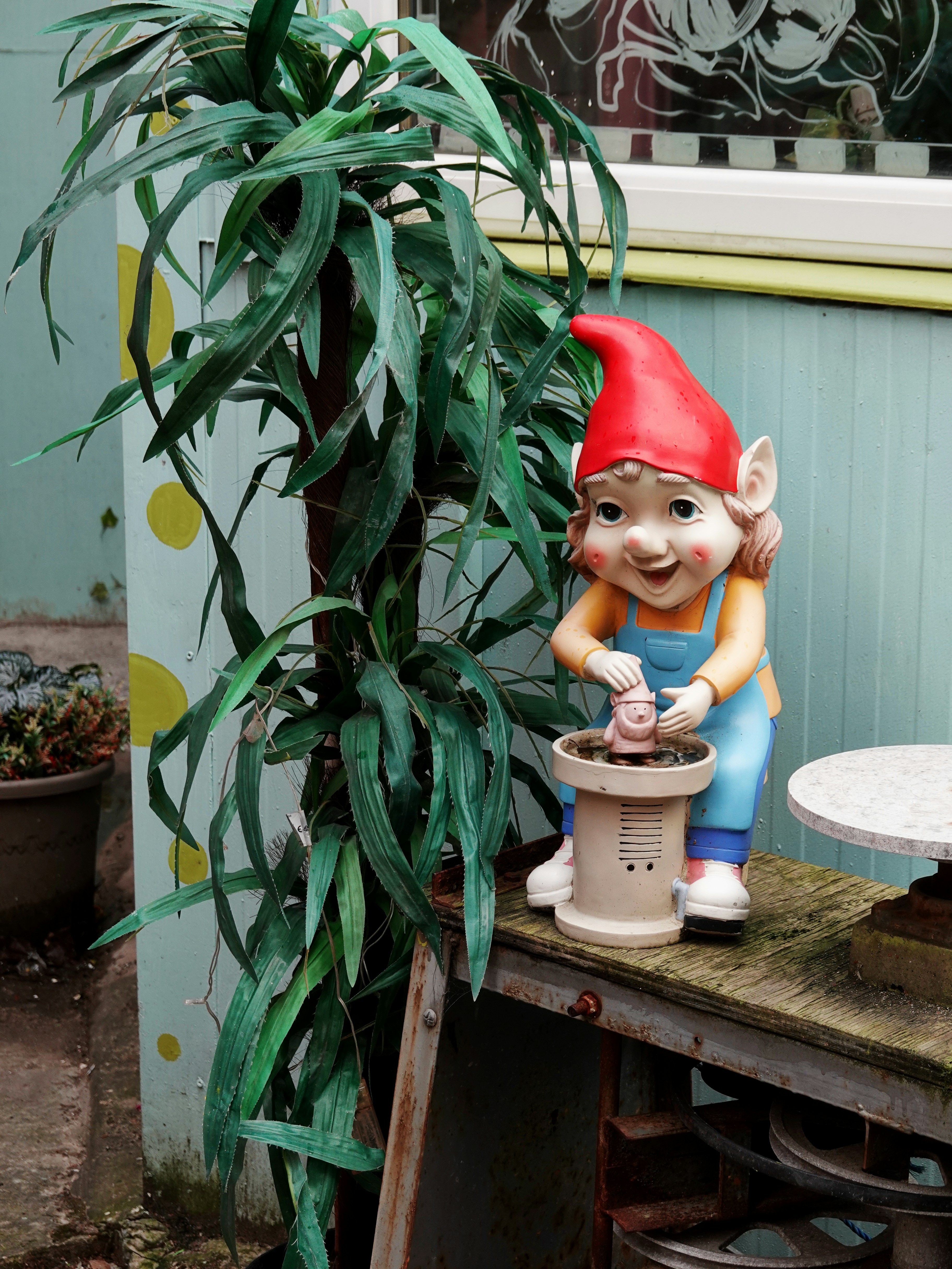 Playful Garden Statue Basks in Afternoon Light