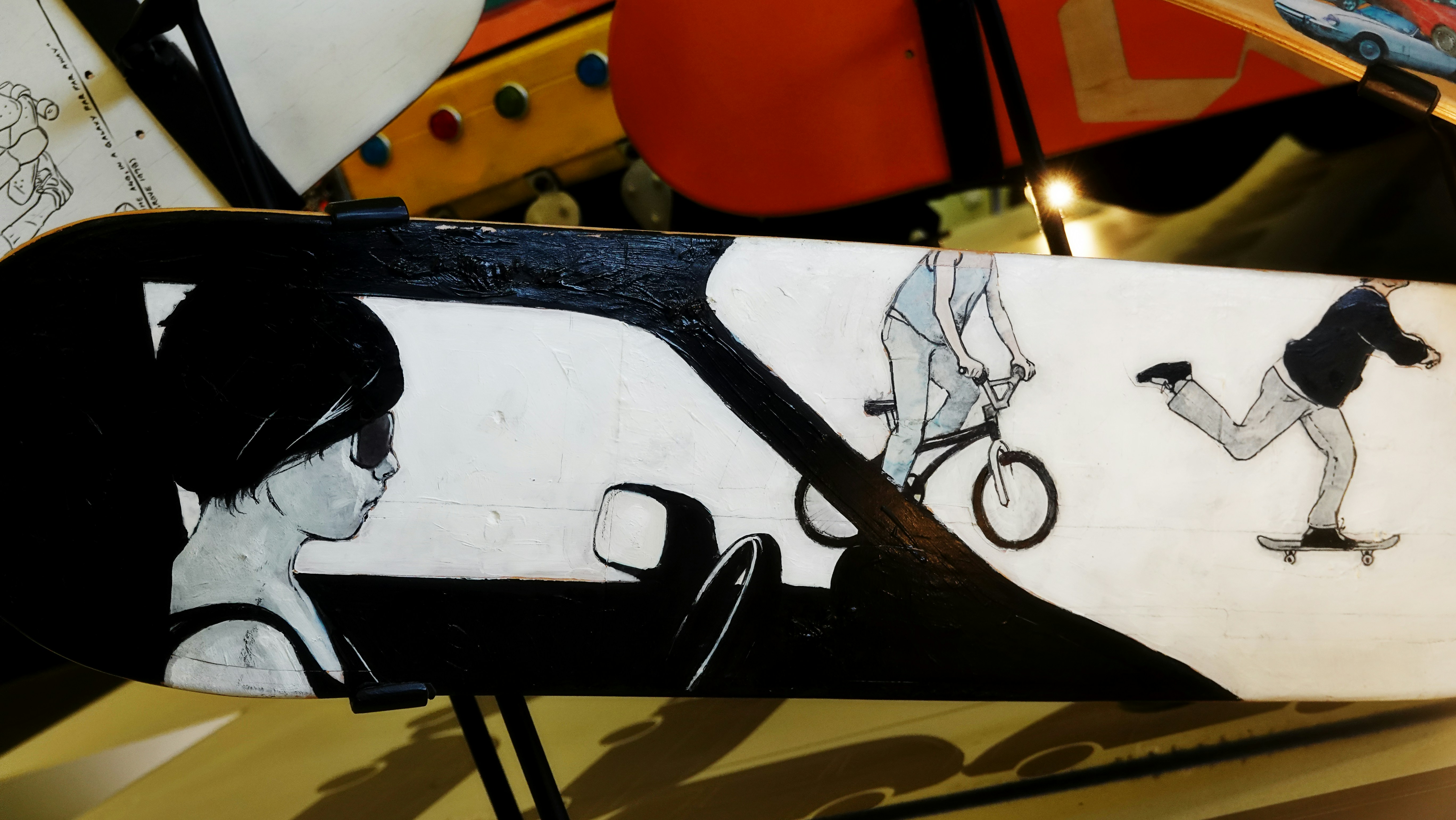Graffiti Car Panel Showcases a Quiet Scene of Street Art and Skateboarder Motion