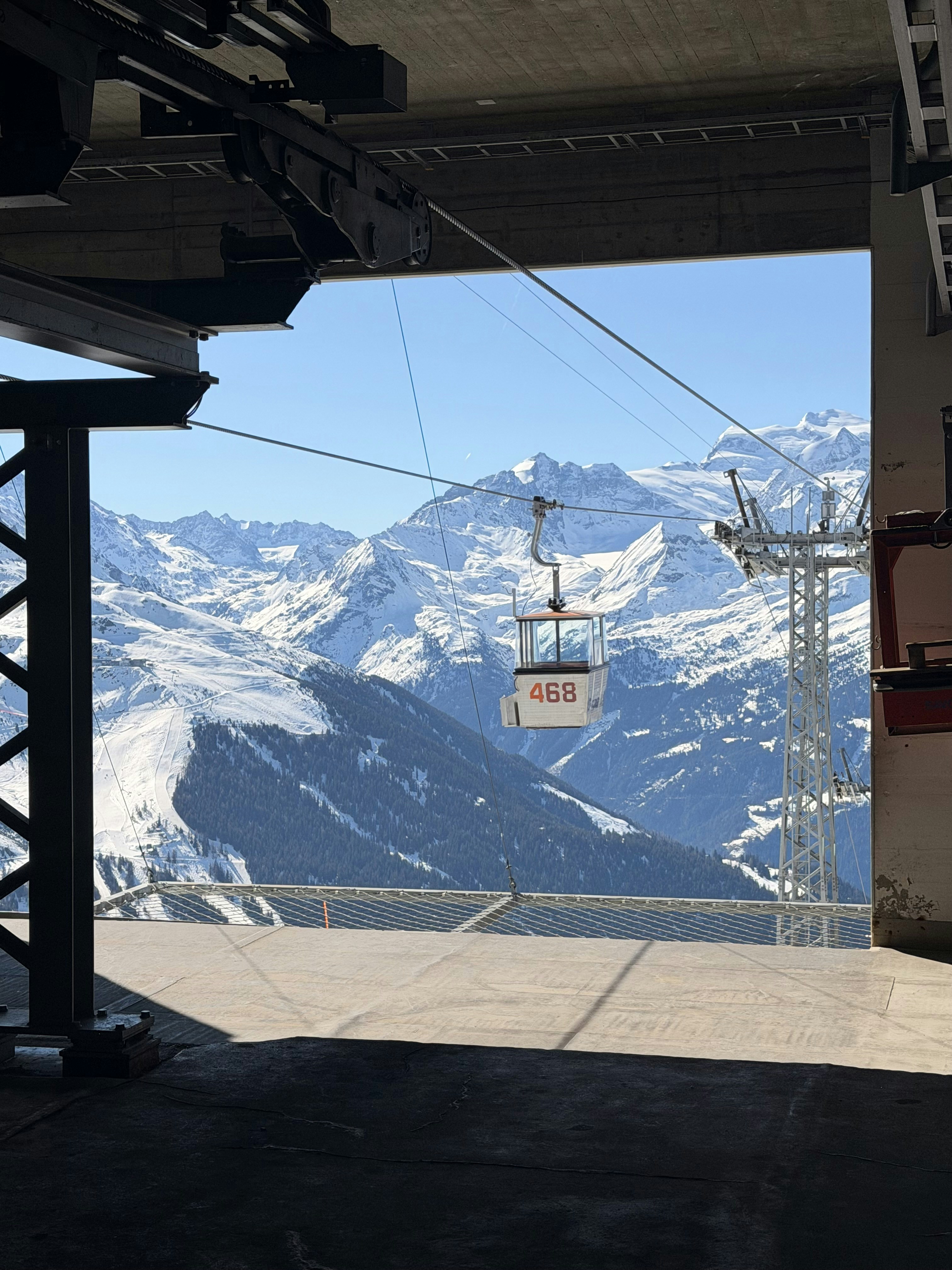 Cable Car to Snowy Peaks: A View from the Platform