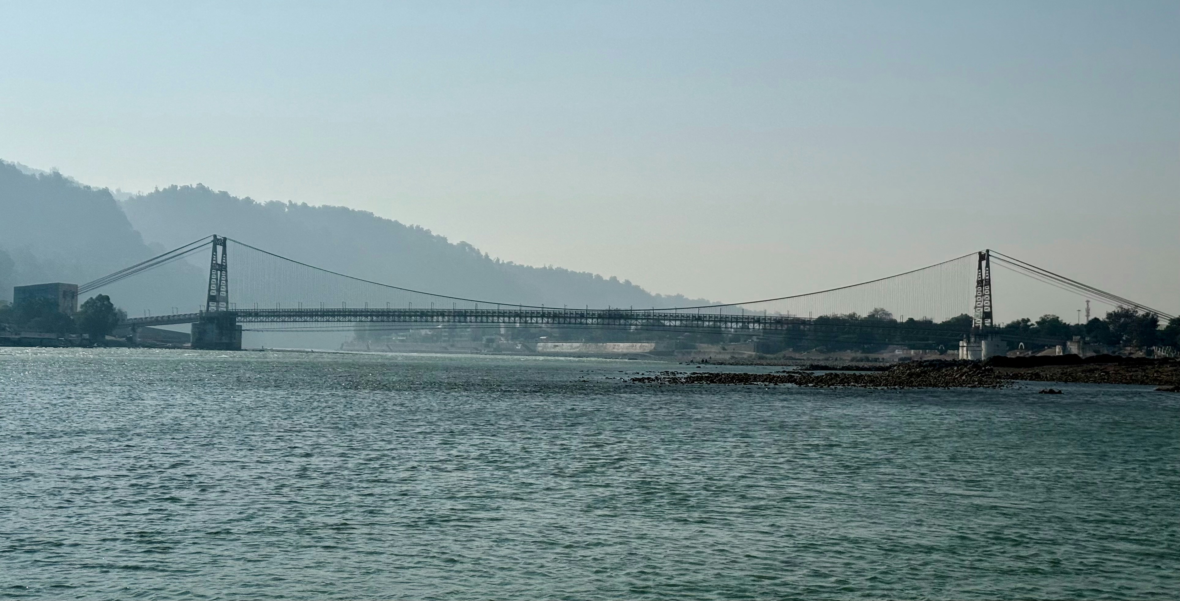 Long Bridge Over Quiet Channel at Dusk