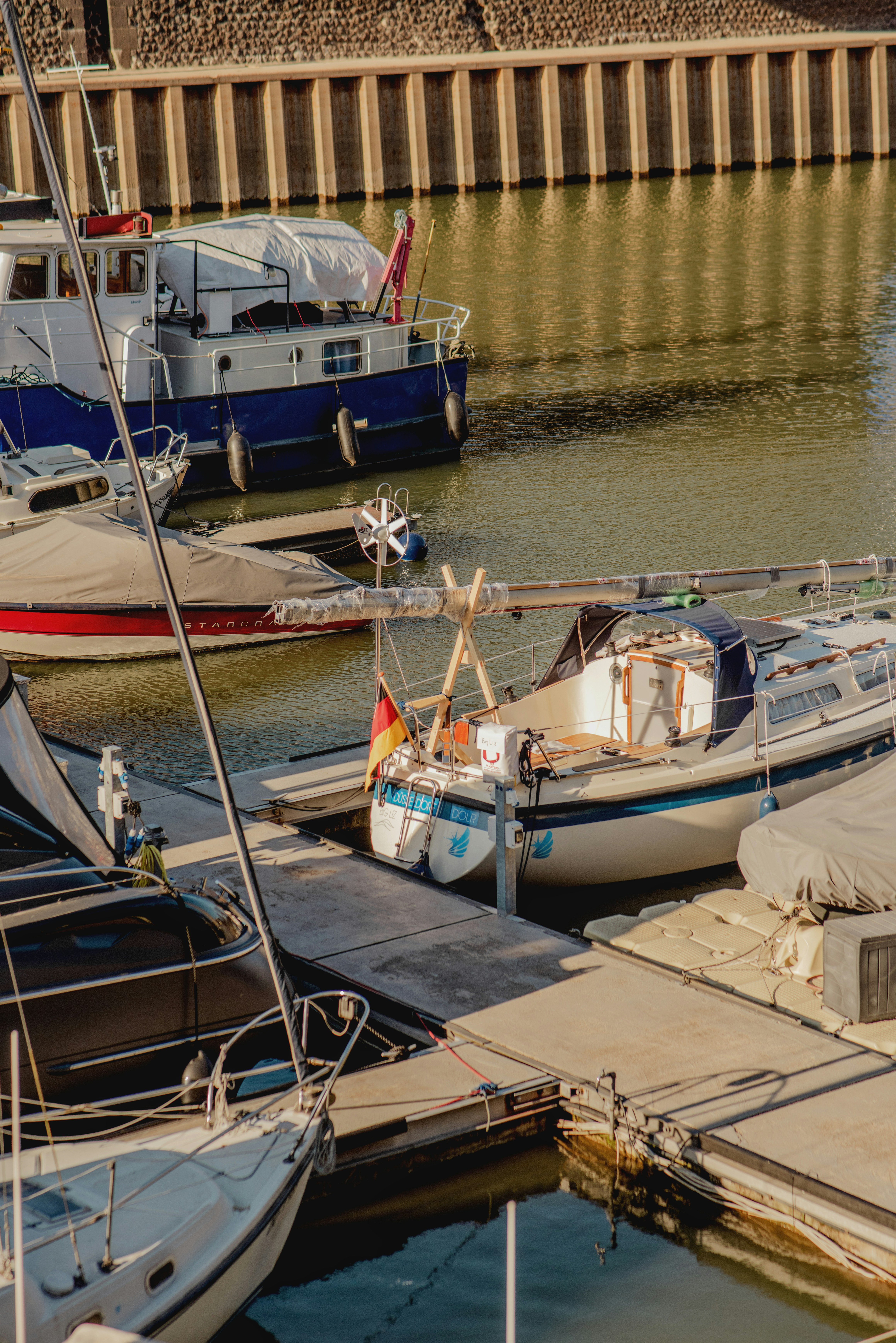 Dockside Frames: Boats Resting Along a Calm Quay