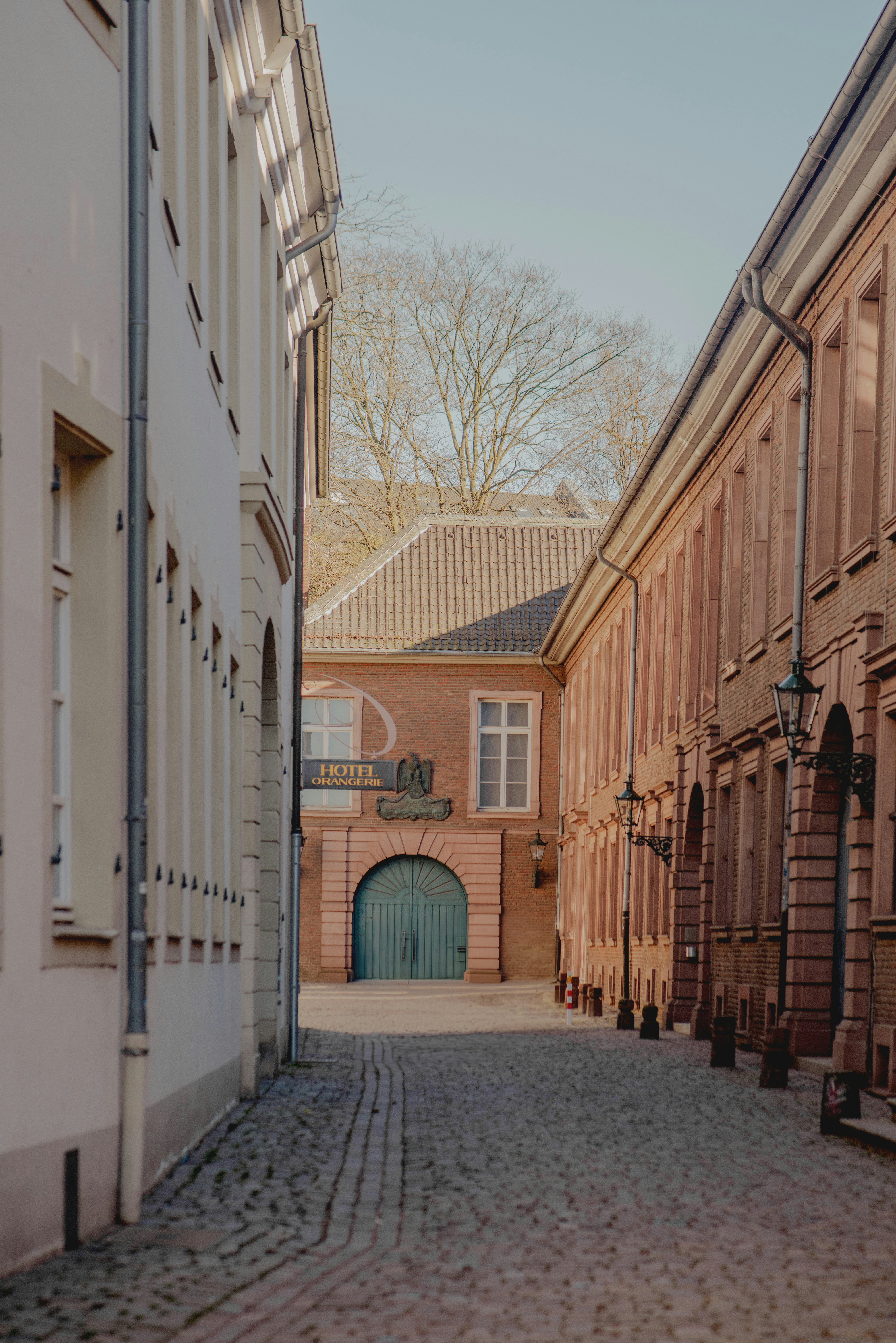 Narrow Passage to a Sunlit Courtyard