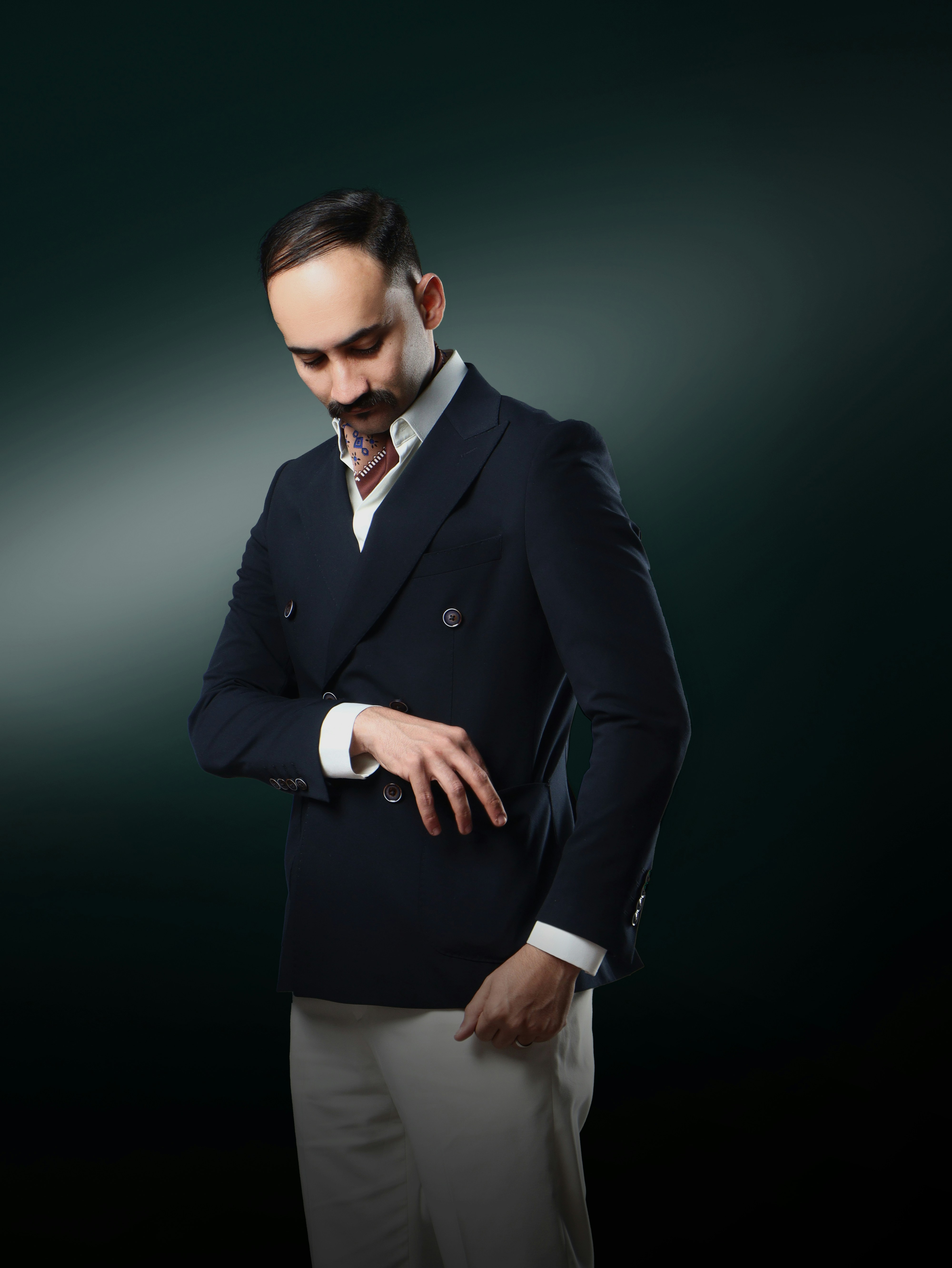 Gentleman's Shadow: A Poised Portrait in Dark Aqua