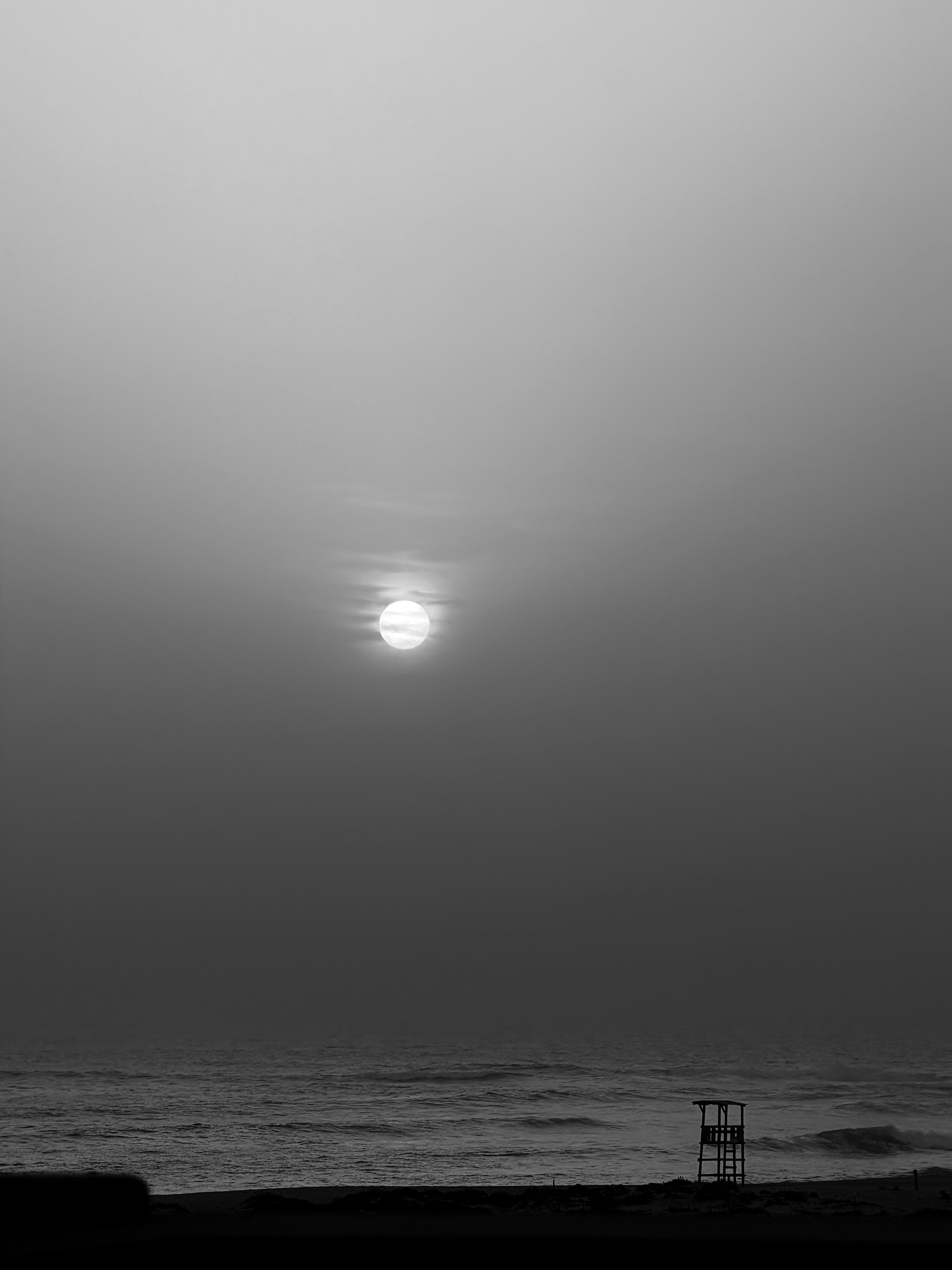 Horizon of Silence: A Quiet Sunset Over a Terraced Sea