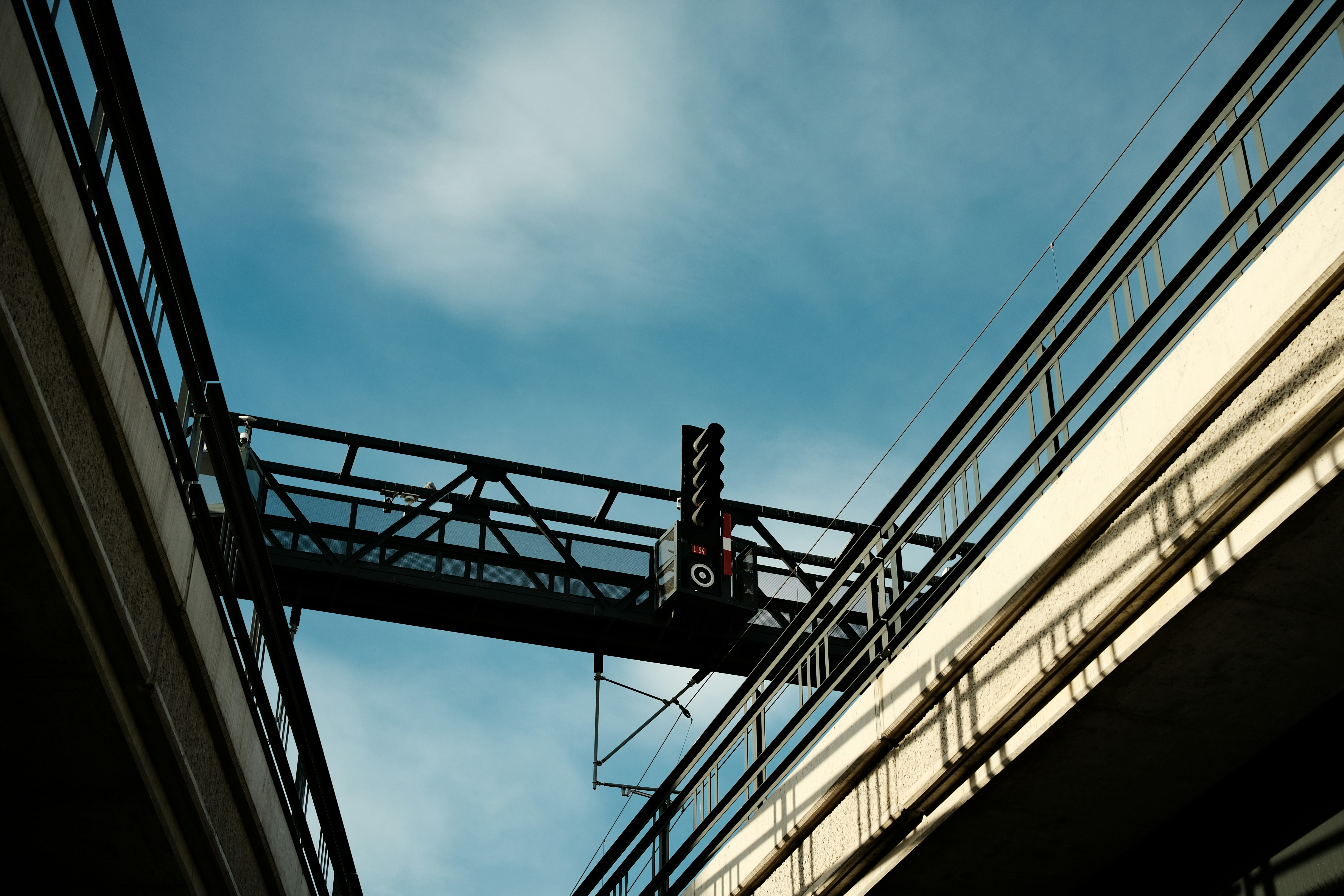 Skyward Span: A Shot Under the Bridge Crane