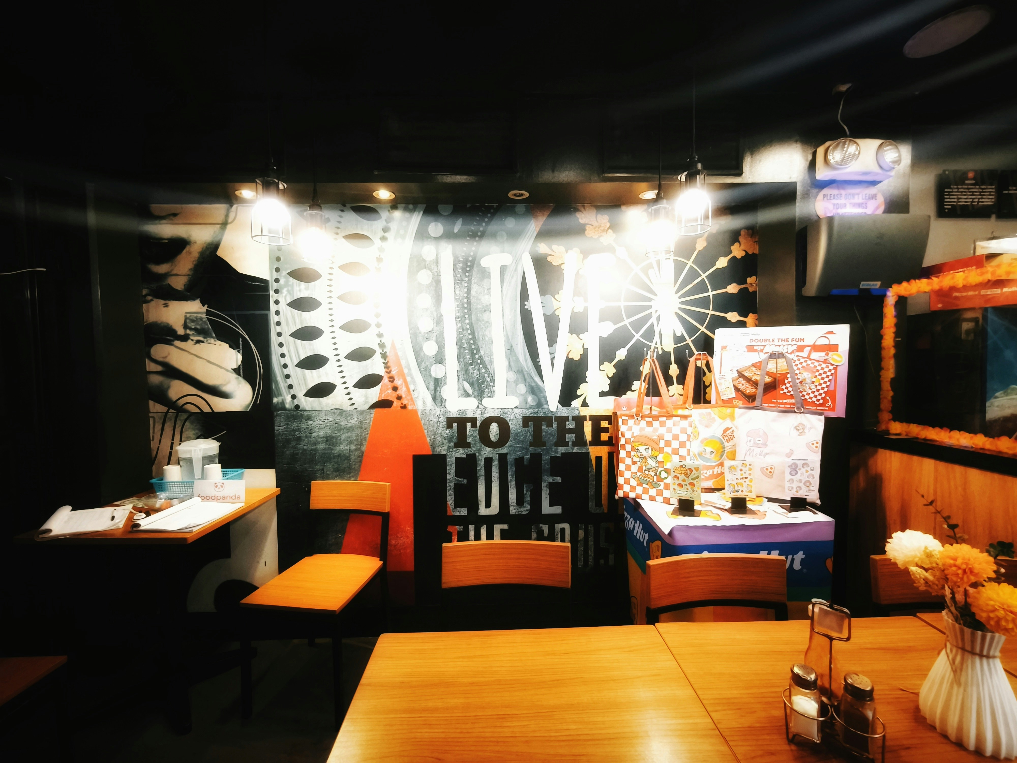Glow and Graze: Neon Backdrop of a Cozy Café Bazaar