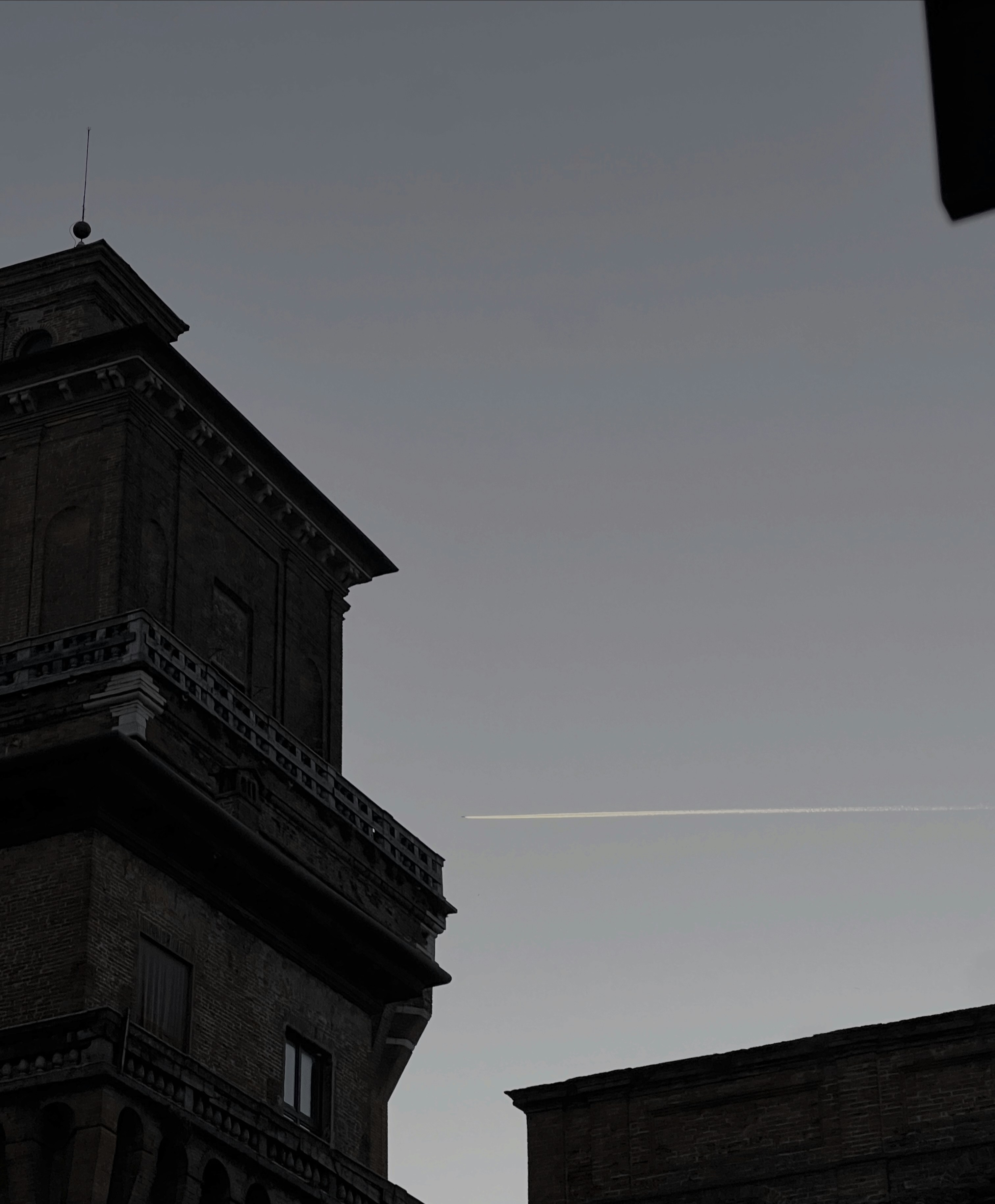 Clocktower Silhouette under a Quiet Sky