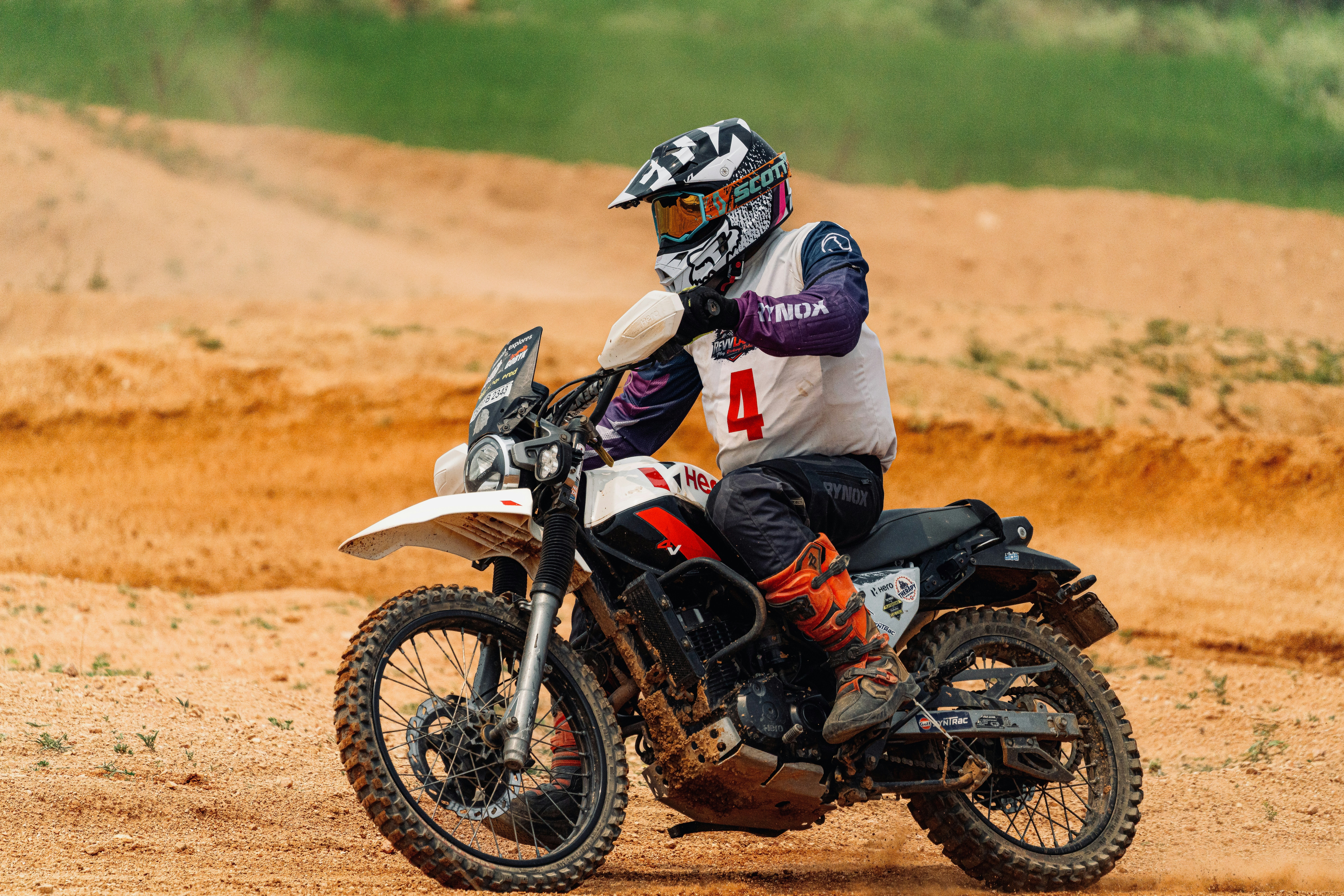 Rider in Motion: Dust and Determination on the Dirt Track