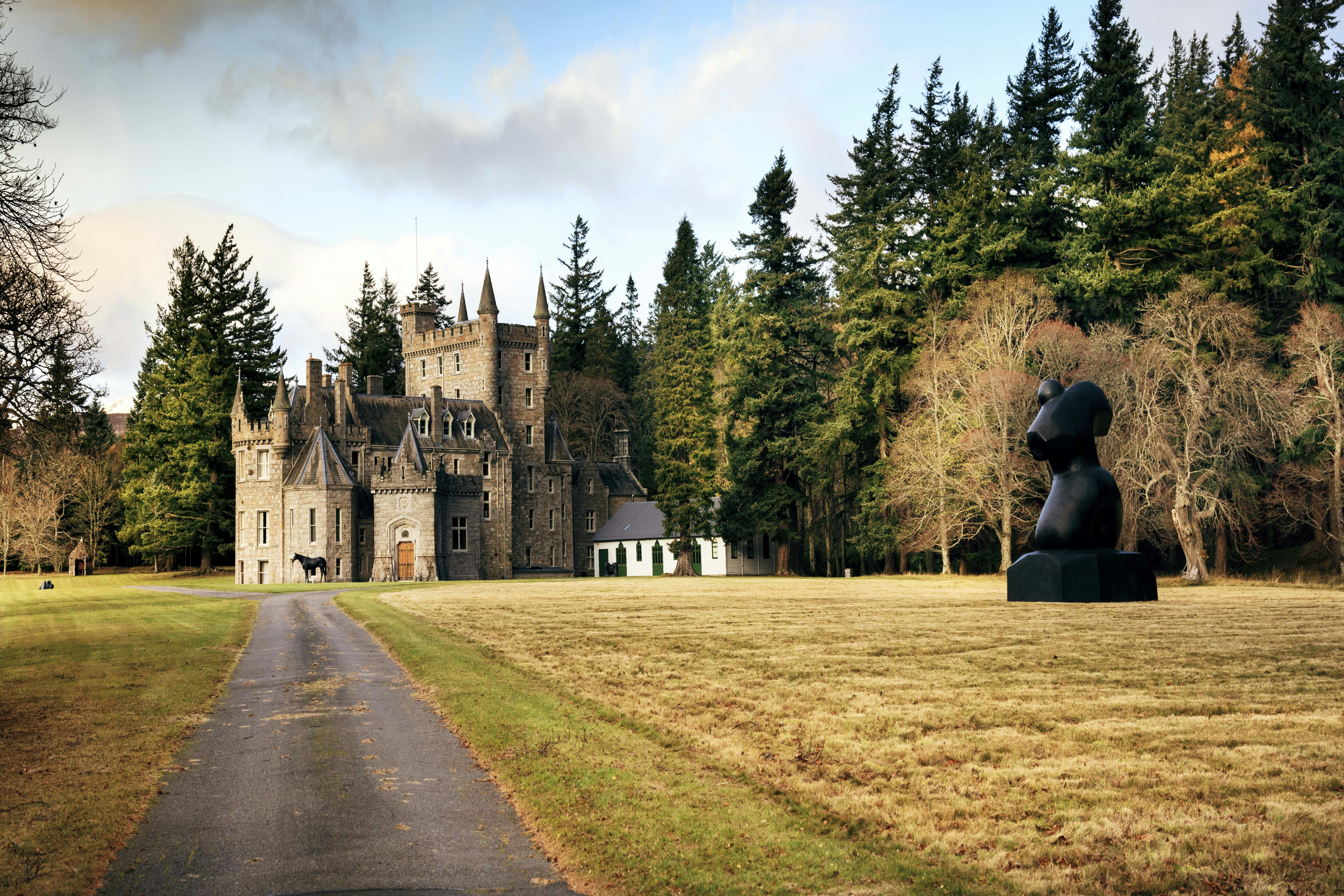 Castle by the Lawn: A Path to the Keep with Modern Sculpture