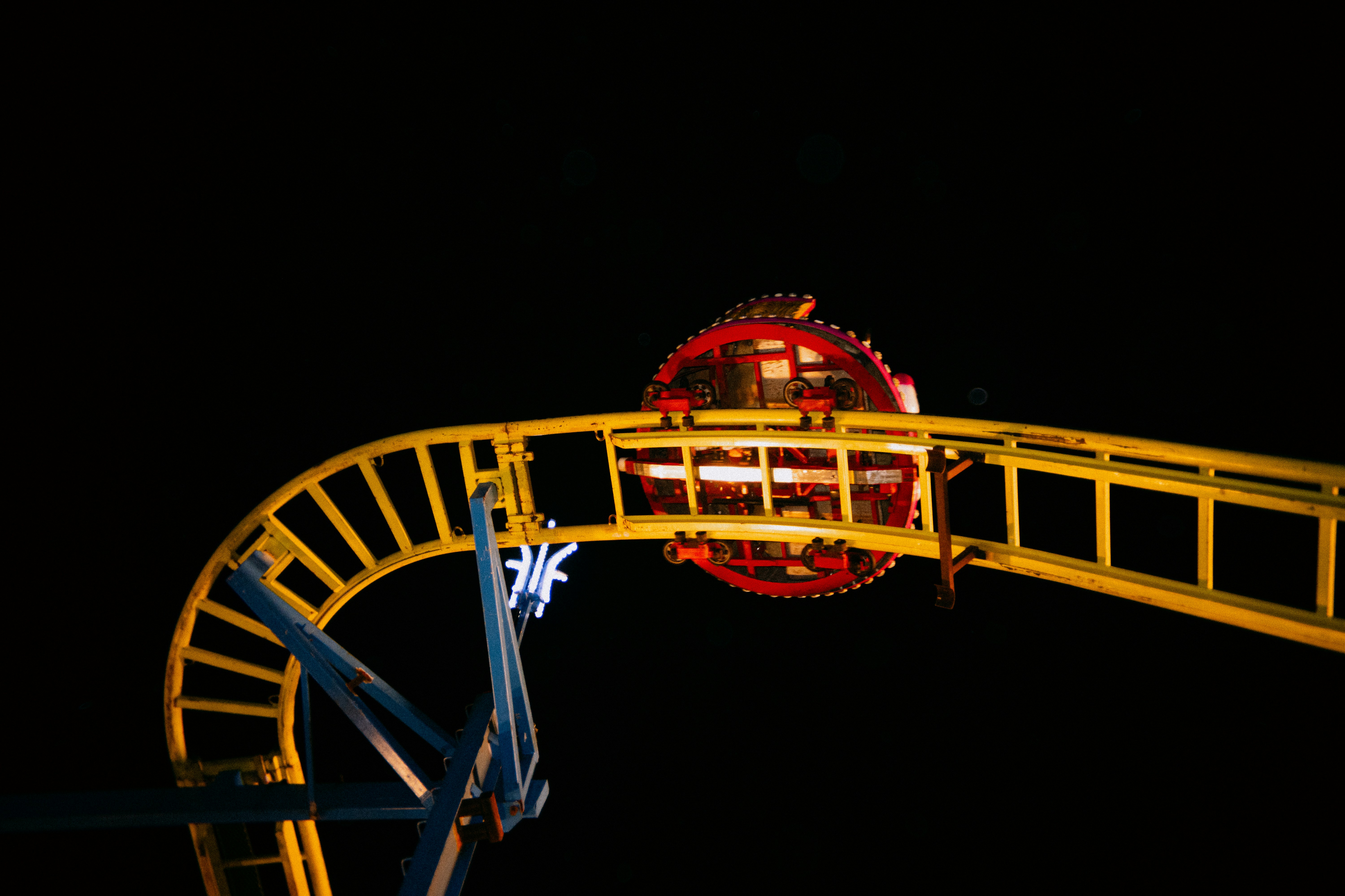 Red Car on a Flared Night Run
