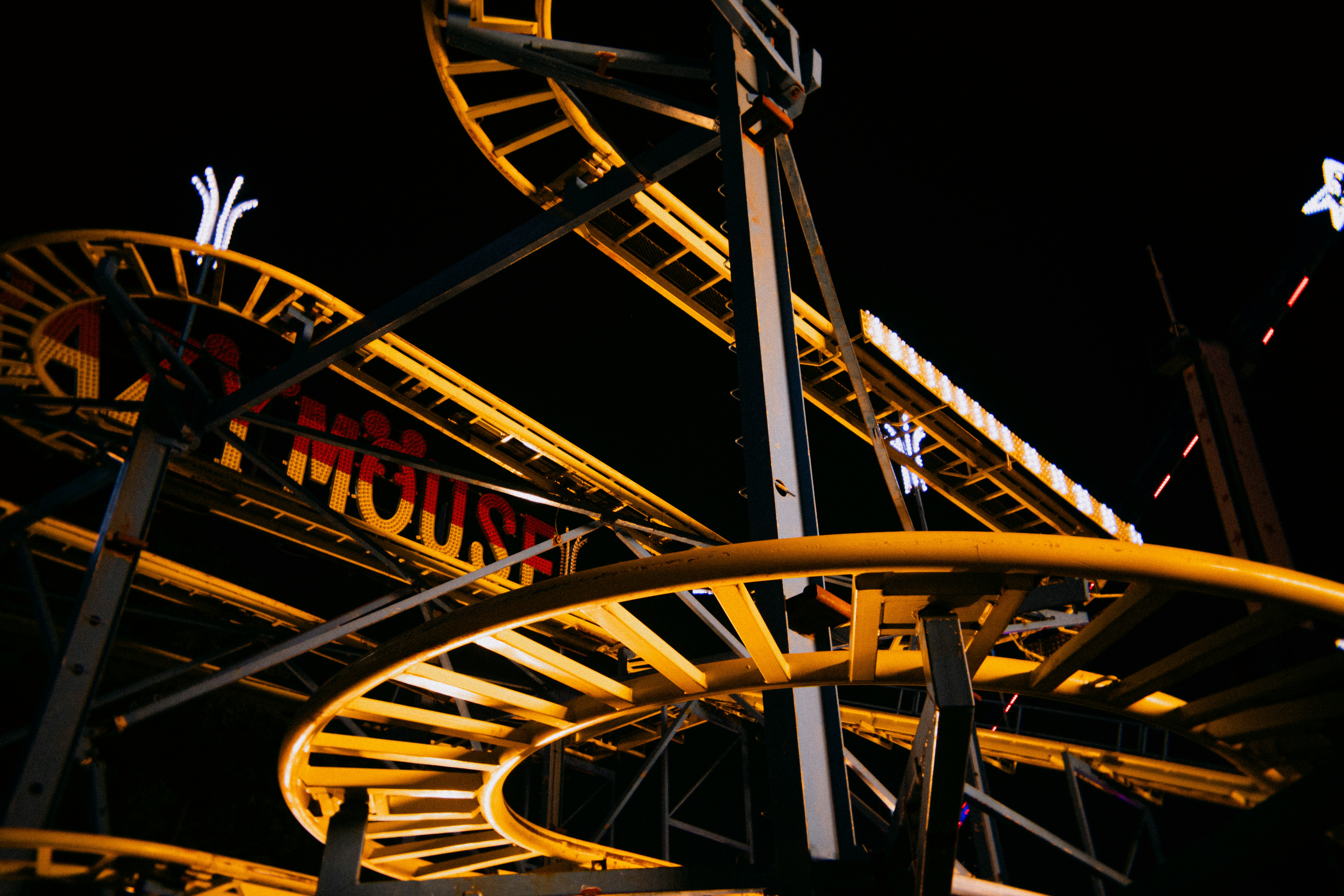 Neon Coils: Nighttime Ride Through the Roto-Sculpted Park
