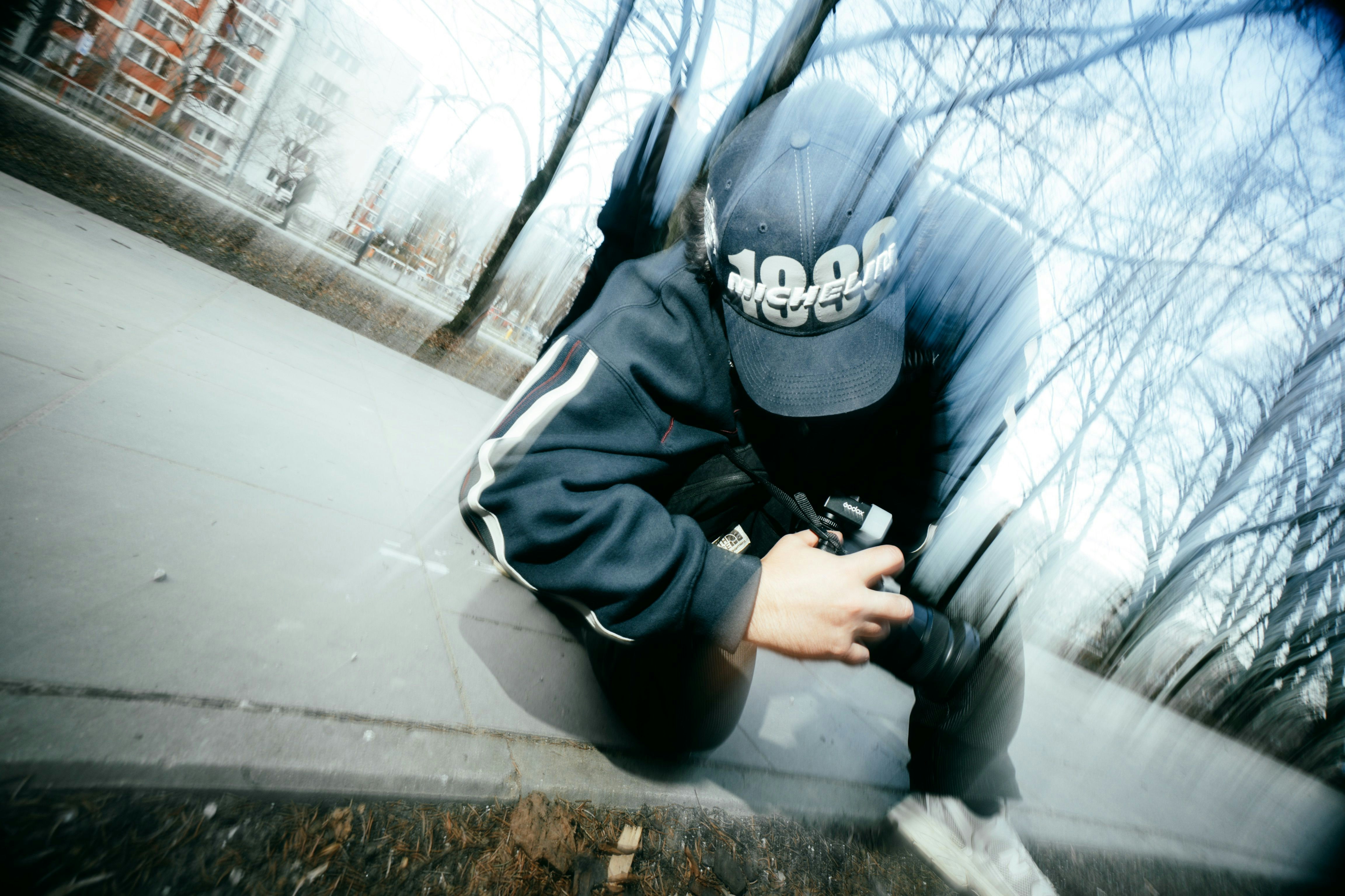 Midnight Lens: A Street Photographer in a Tilted Moment