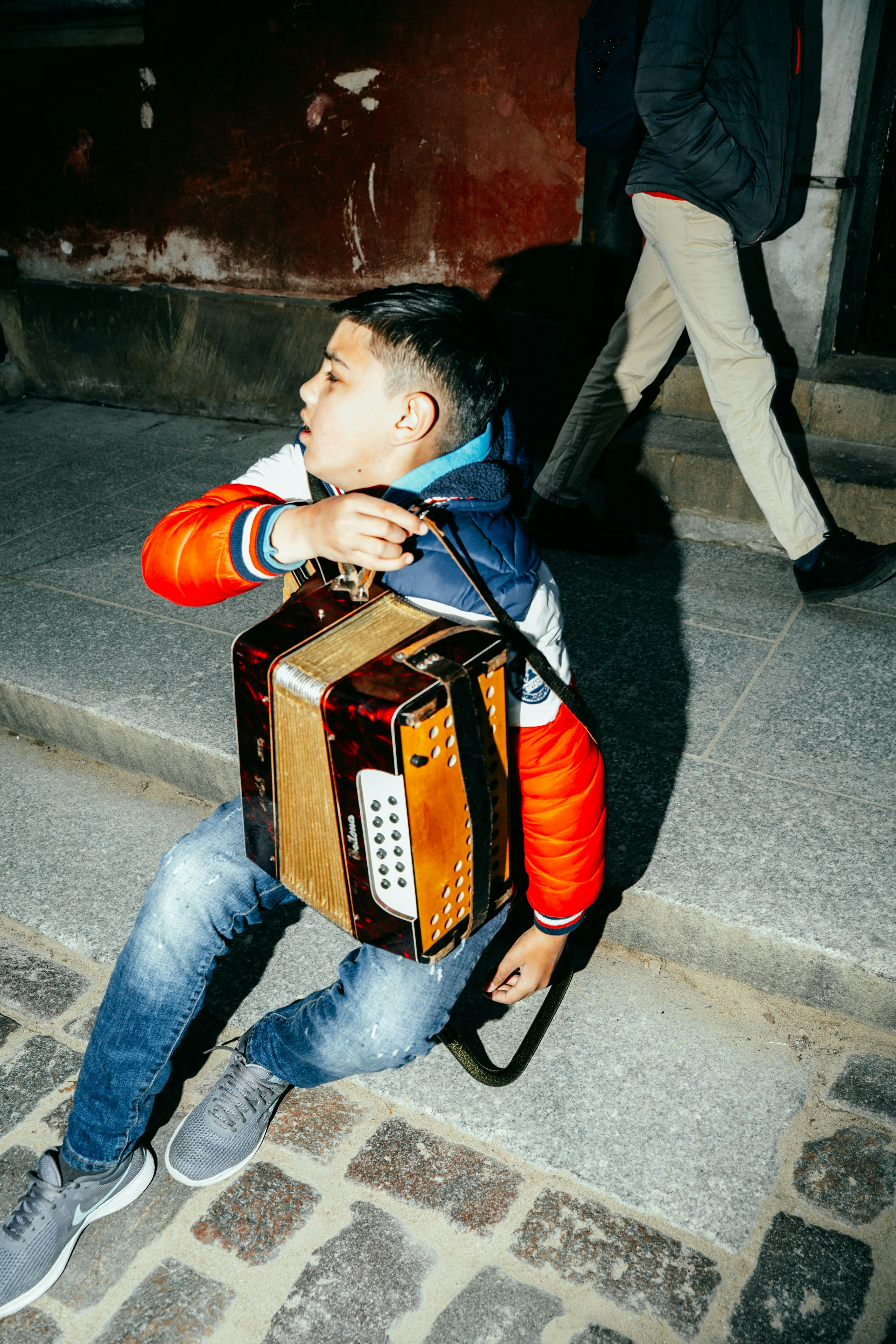 Street Melodies: A Young Musician On The Move