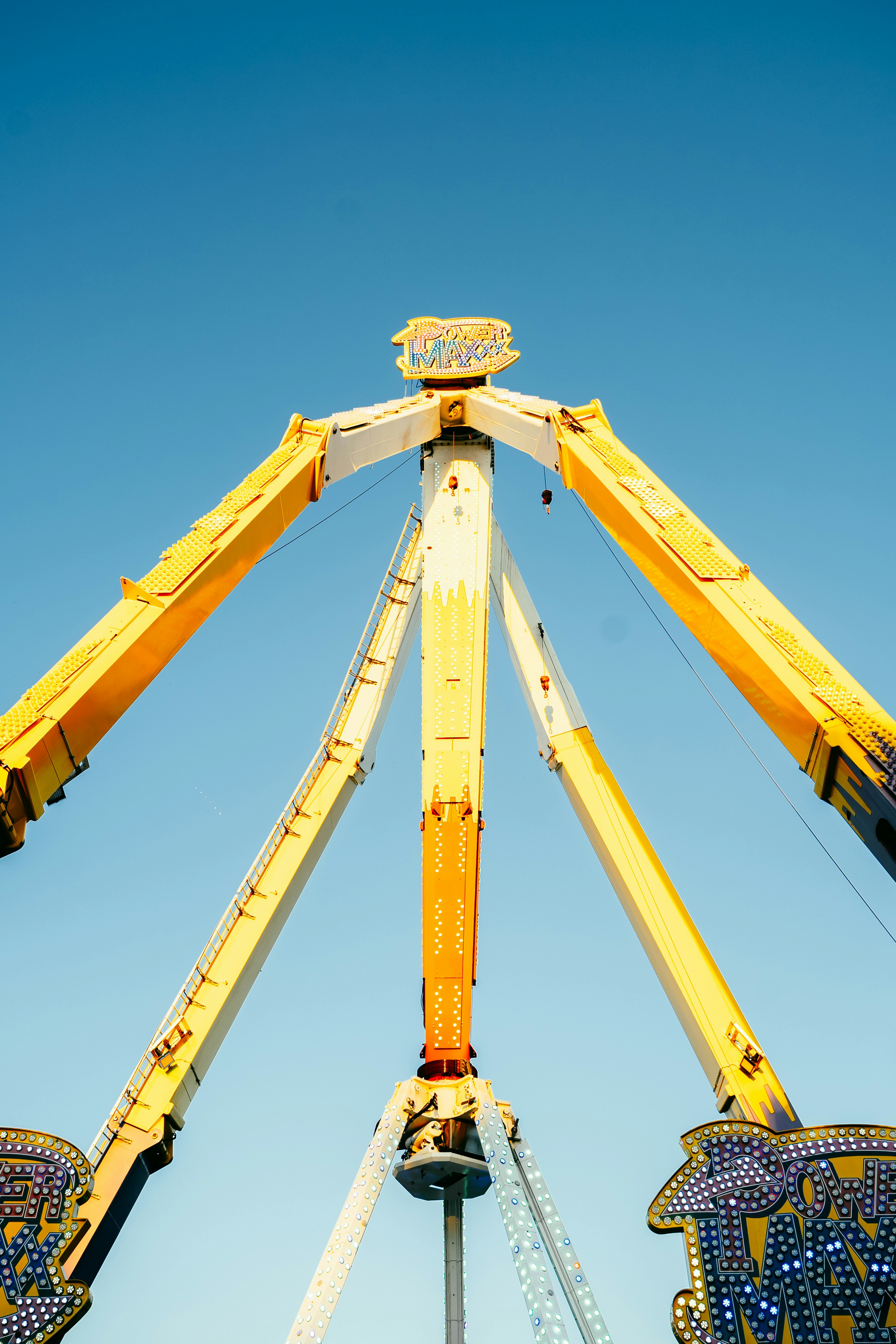Triangle of Thrills: The Central Support of a Golden Ride Reaches for the Sky
