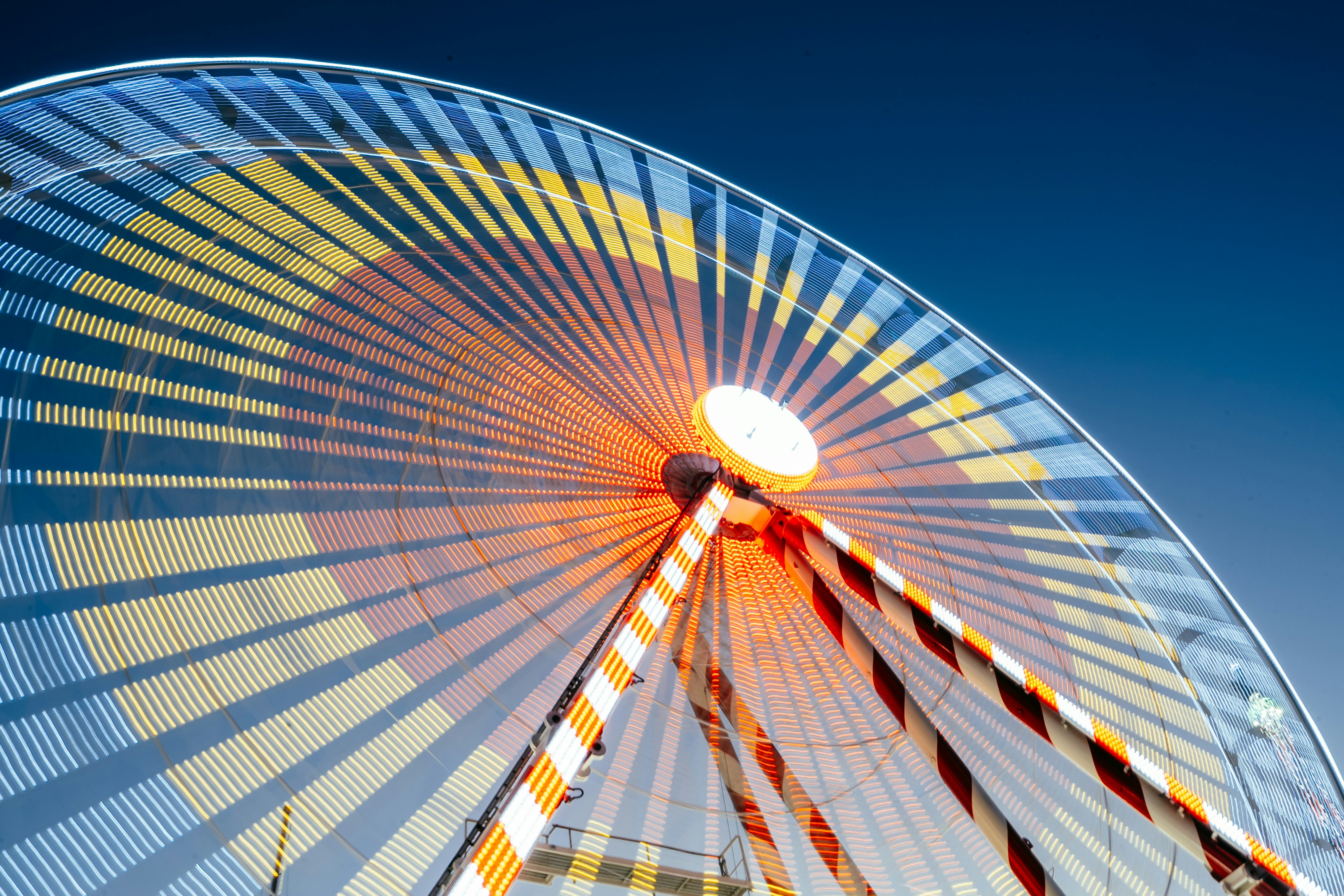 Spinning Spotlight: A Tilt-Shift View of the Ferris Wheel in Motion