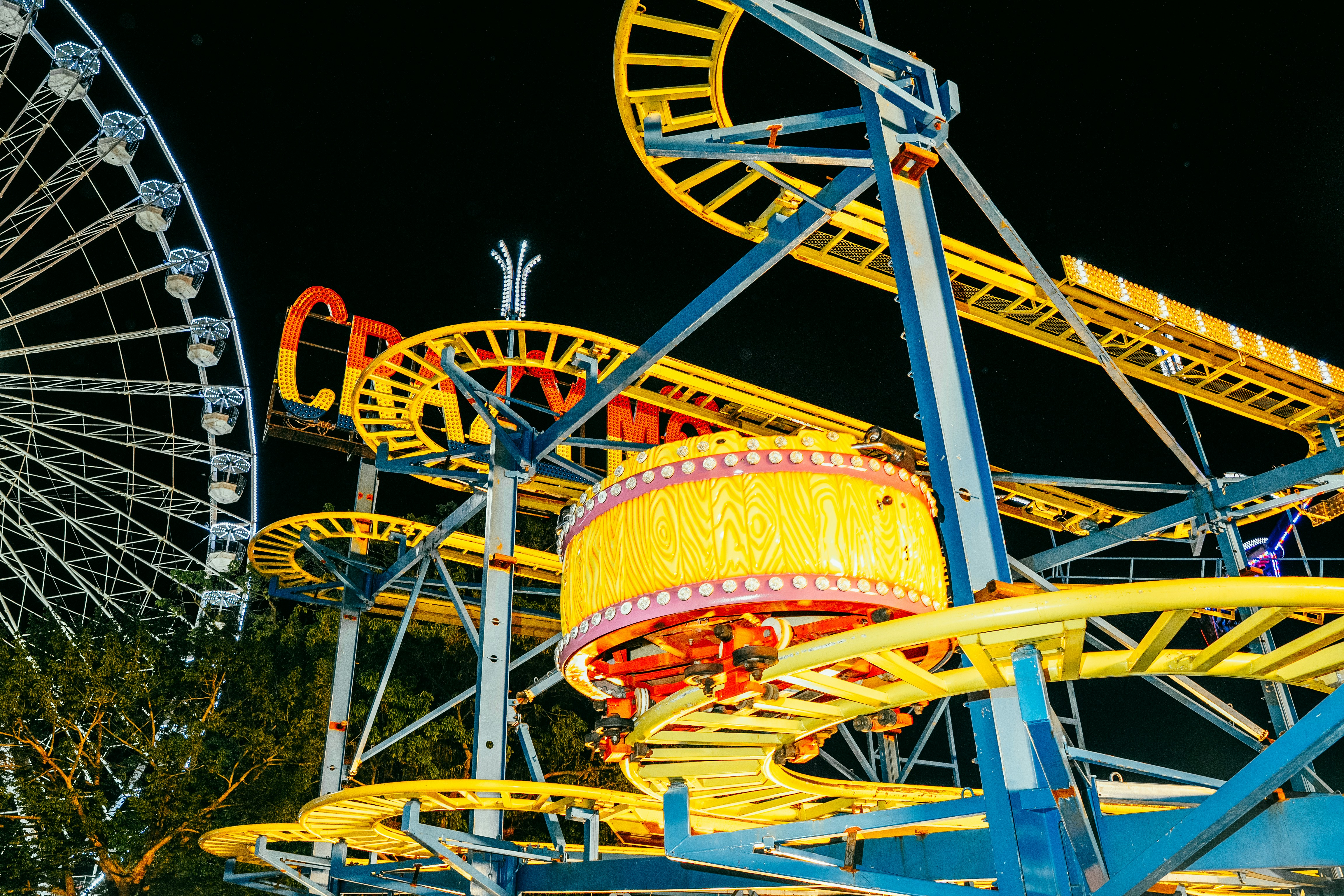 Neon Whirl: A Night Ride Through the Carnival's Gears