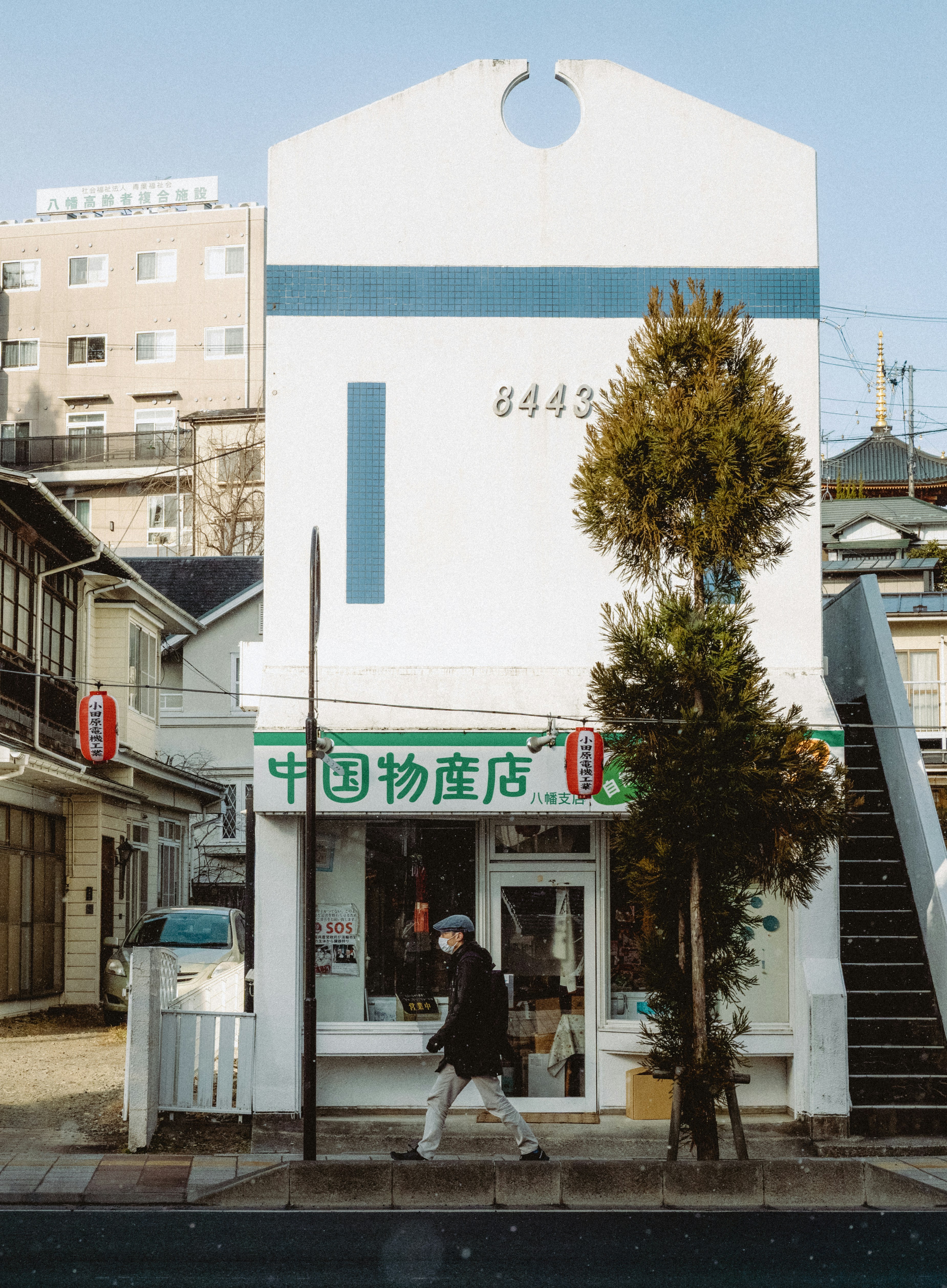 Streetfront Market and Stairway: A Quiet Urban Moment