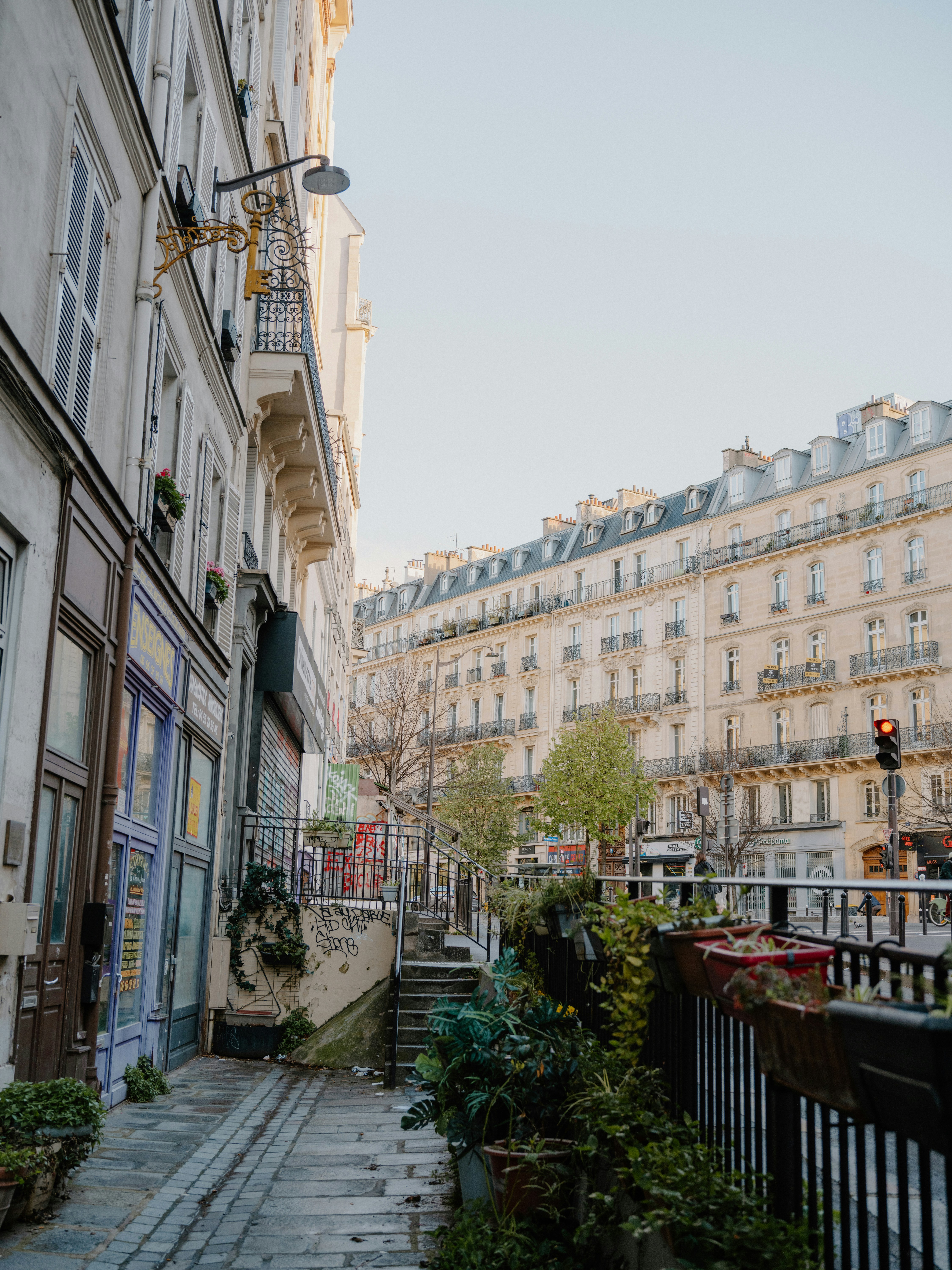 Quiet Parisian Alley Gathers Light Between Buildings