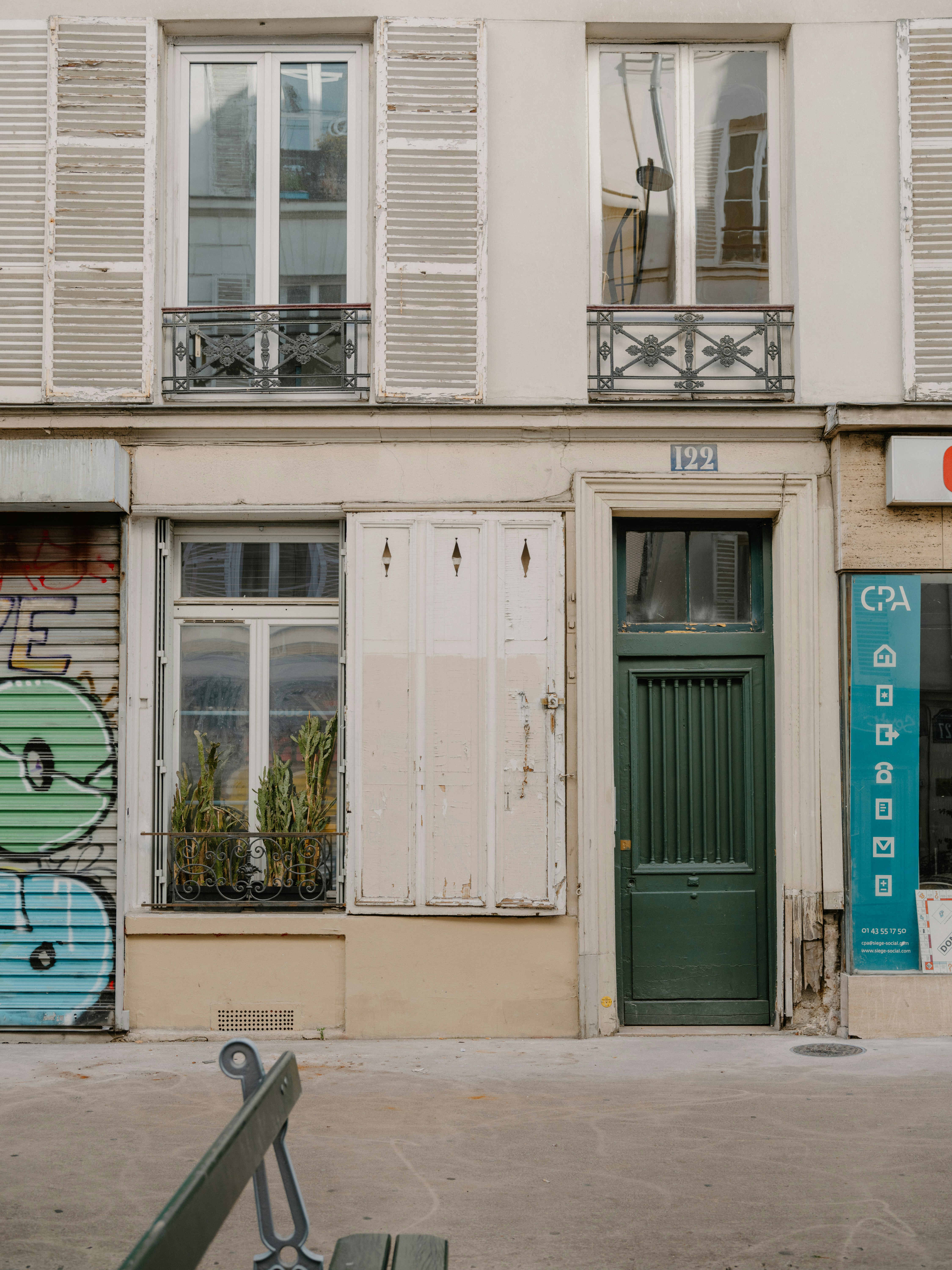 Green Door with Shuttered Window—A Quiet Parisian Facade